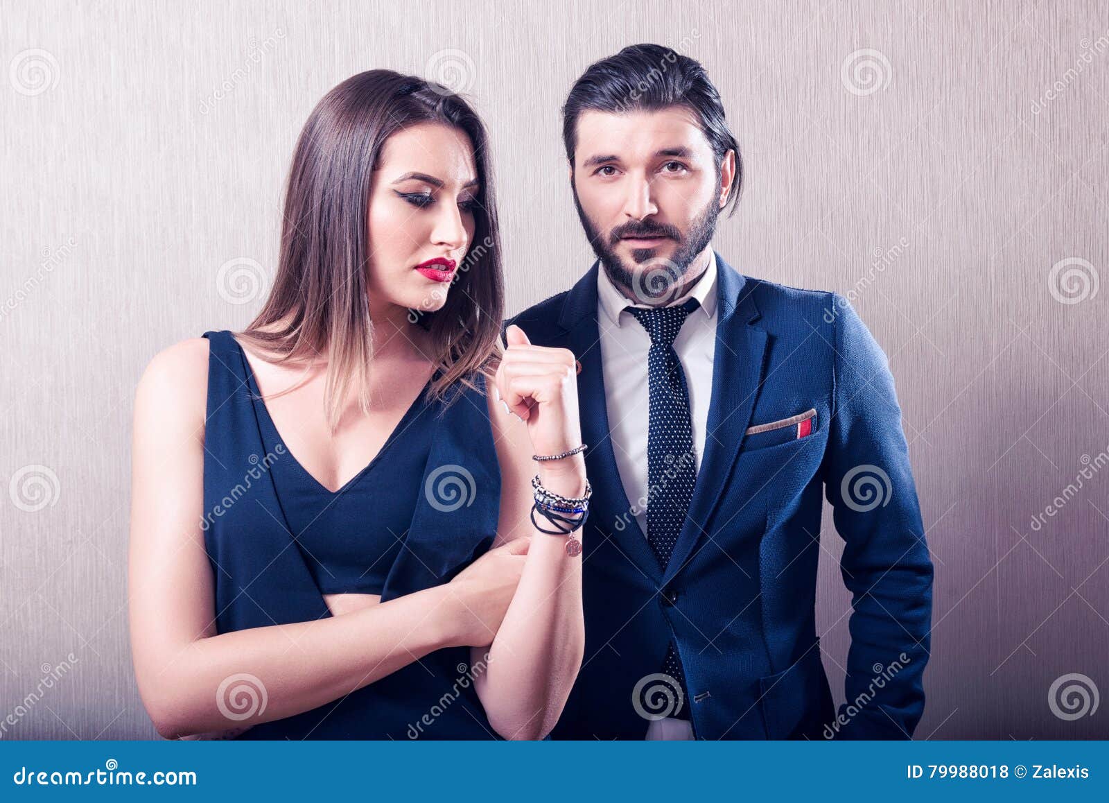 Heterosexual Couple Interacting and Elegantly Dressed Stock Photo ...