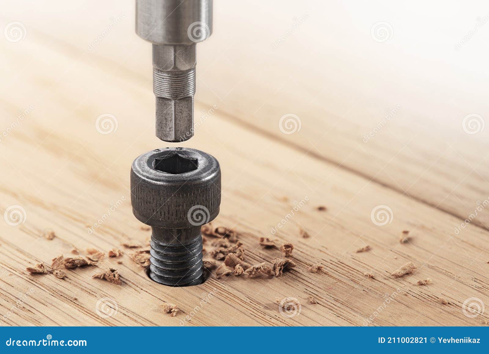 Hex Bolt Hex Bit in Wooden Oaks Plate. Spanner, Bolt, and Nuts Stock ...