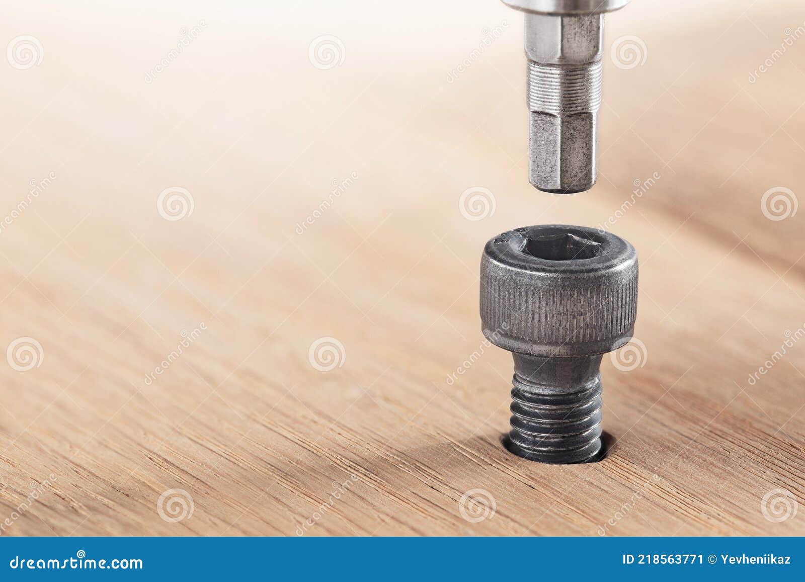 Hex Bolt Hex Bit in Wooden Oaks Plate. Spanner, Bolt, and Nuts Stock ...