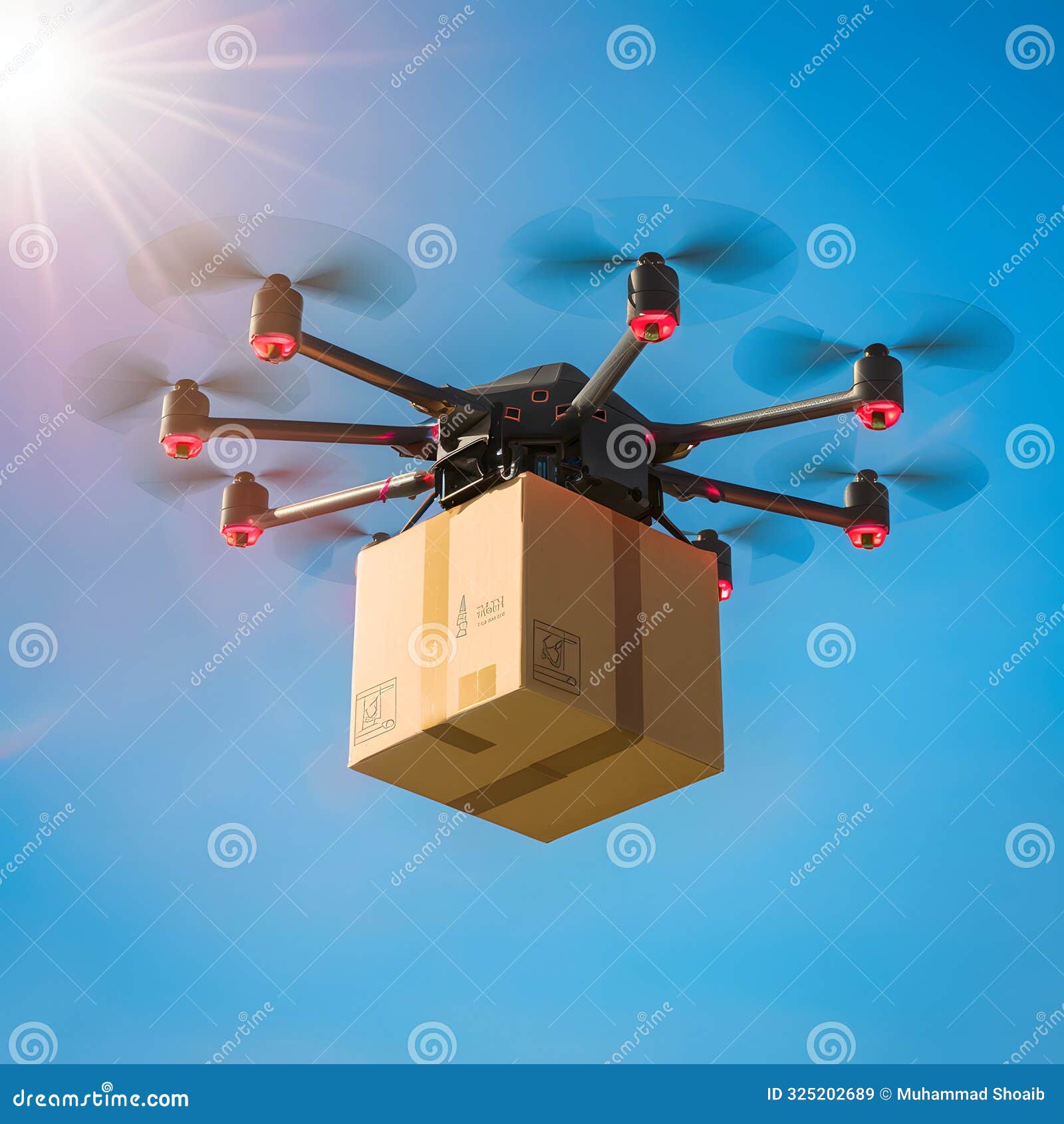 Hexacopter Drone in Flight Against Clear Blue Sky, Carrying Rectangular ...