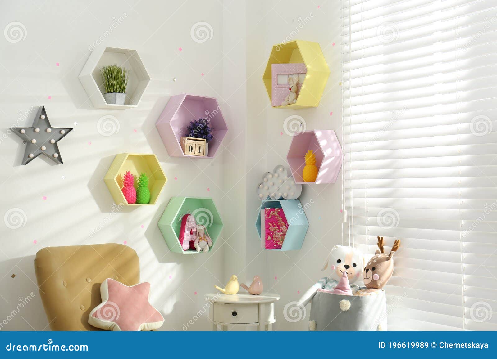 Hexagon Shaped Shelves on White Wall in Nursery. Interior Design Stock ...
