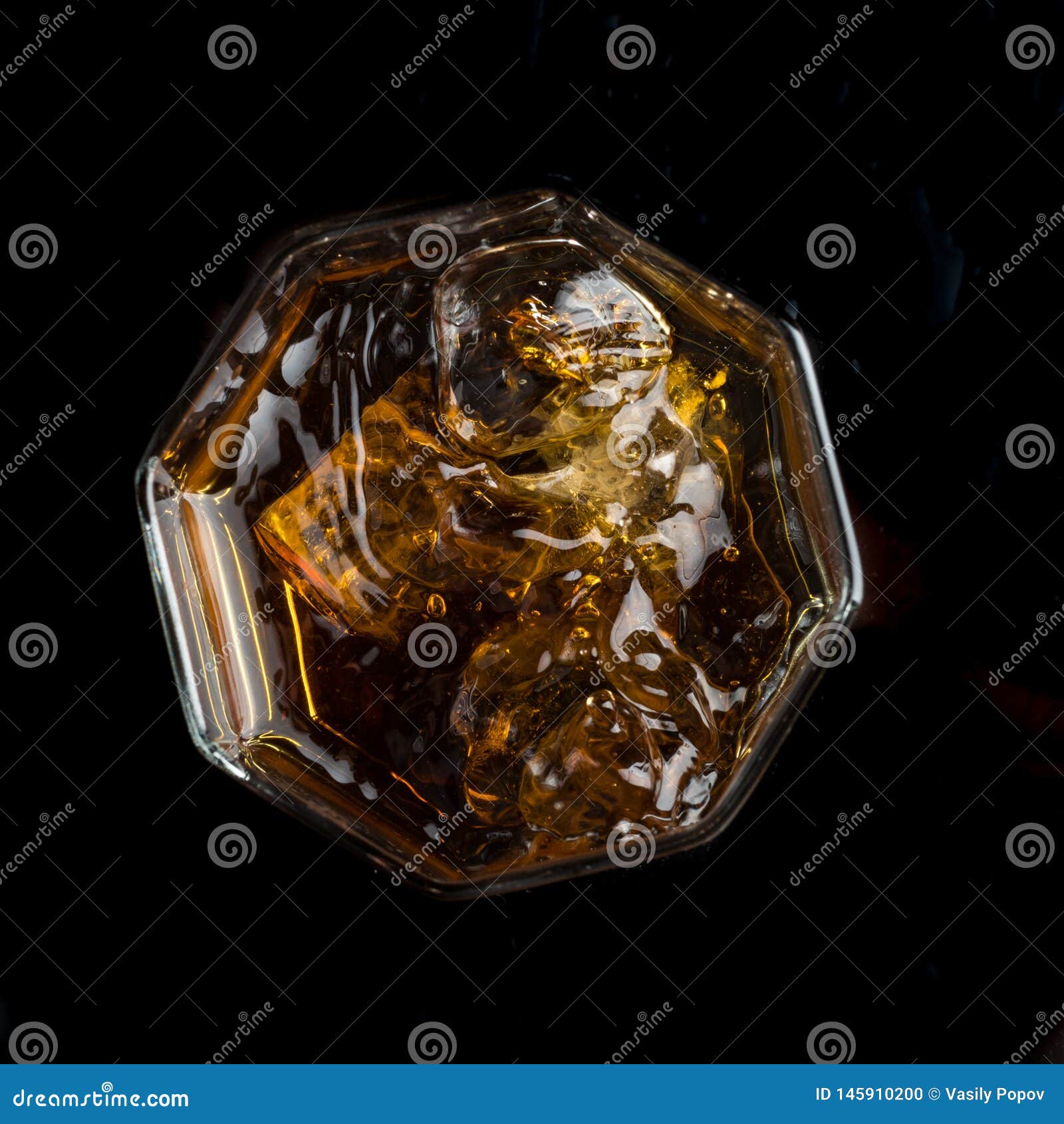 Hexagonal Glass Of Whiskey With Three Cubes Of Real Ice Top View ...