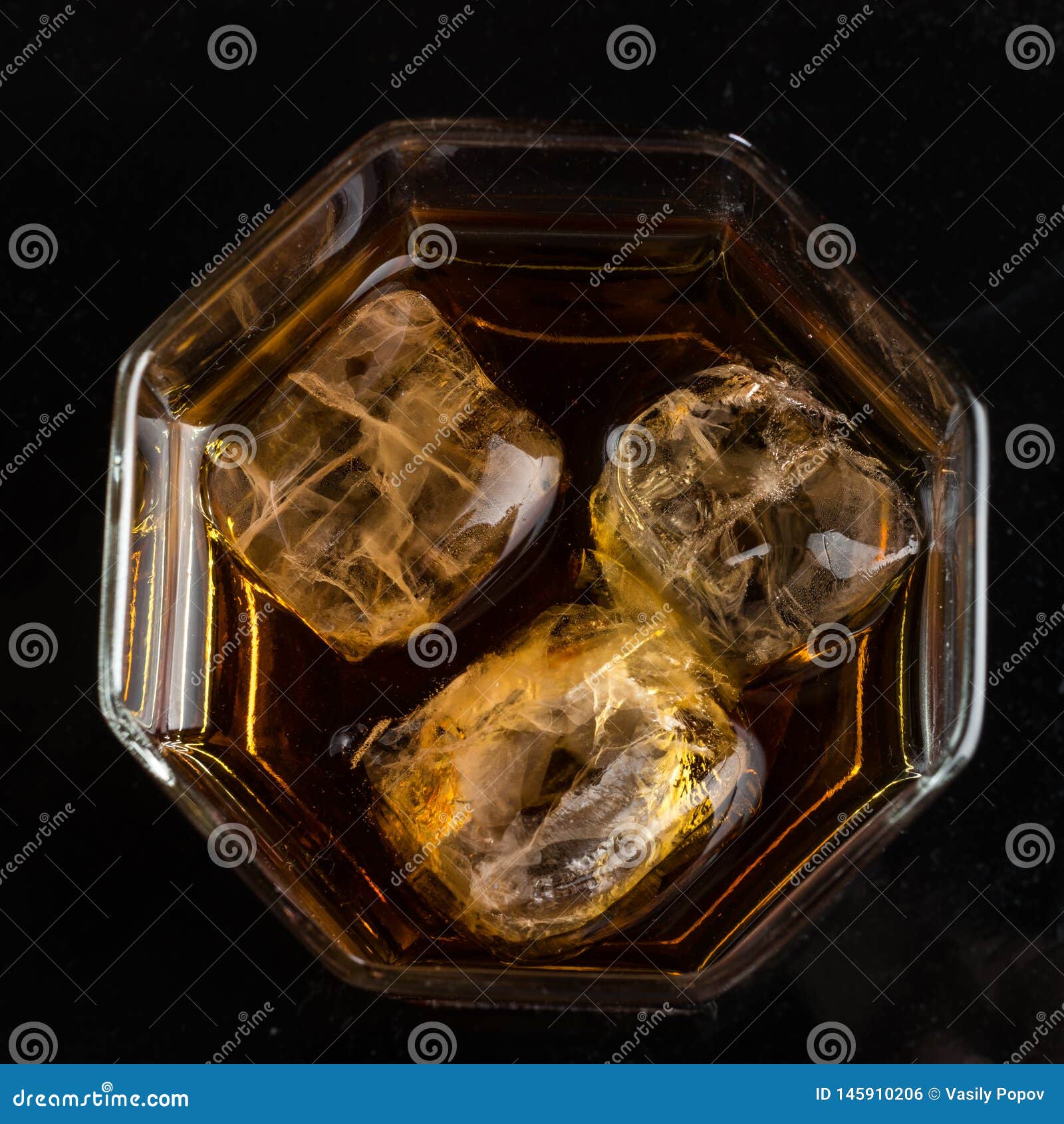 Hexagonal Glass of Whiskey with Three Cubes of Real Ice Top View Stock ...