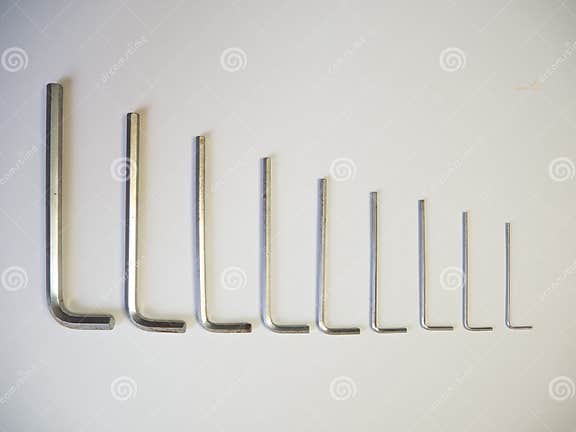 Hexagonal Key on a White Background. Copy Space. Stock Image - Image of ...