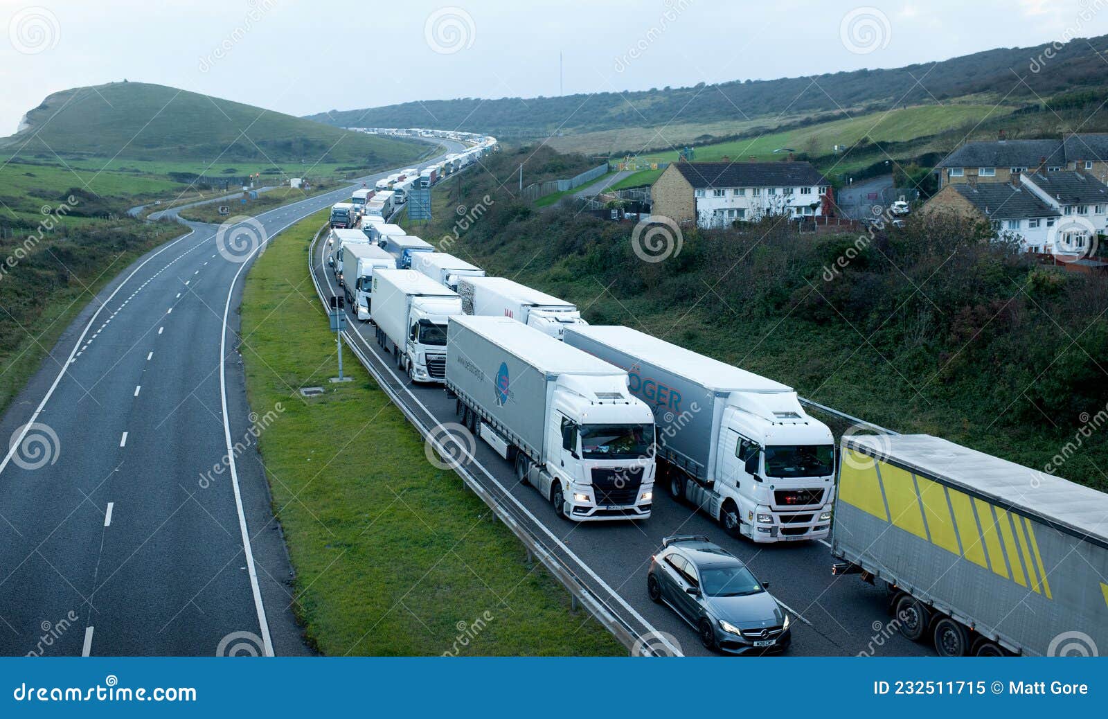 HGV Lorries Queue on the M20 Motorway Outside Dover, the U.K.s Largest ... HGV Lorries Queue on the M20 Motorway Outside Dover, the U.K.s Largest ...