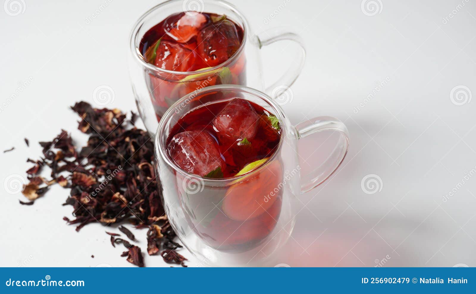 Hibiscus Cold Tea Drink with Ice Cubes and Lemon in Glass Stock Image ...
