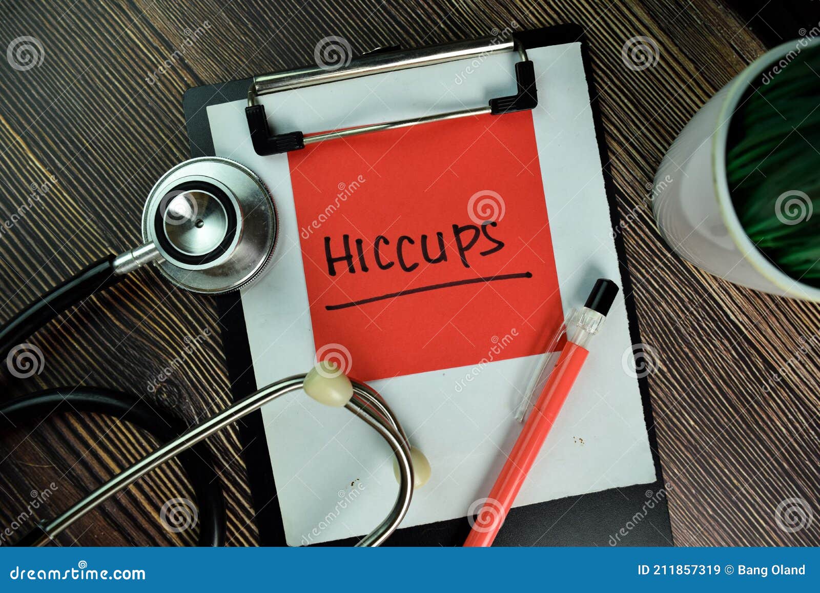 Hiccups Write On Sticky Notes Isolated On Wooden Table Stock Image