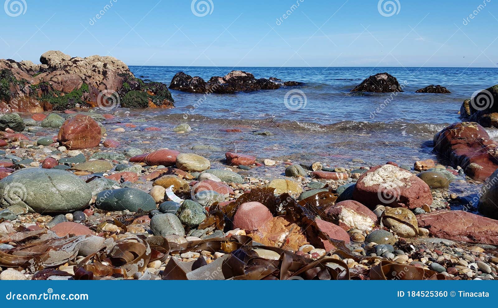 Hidden Beach with Red Rocks in Howth Ireland Stock Photo - Image of ...