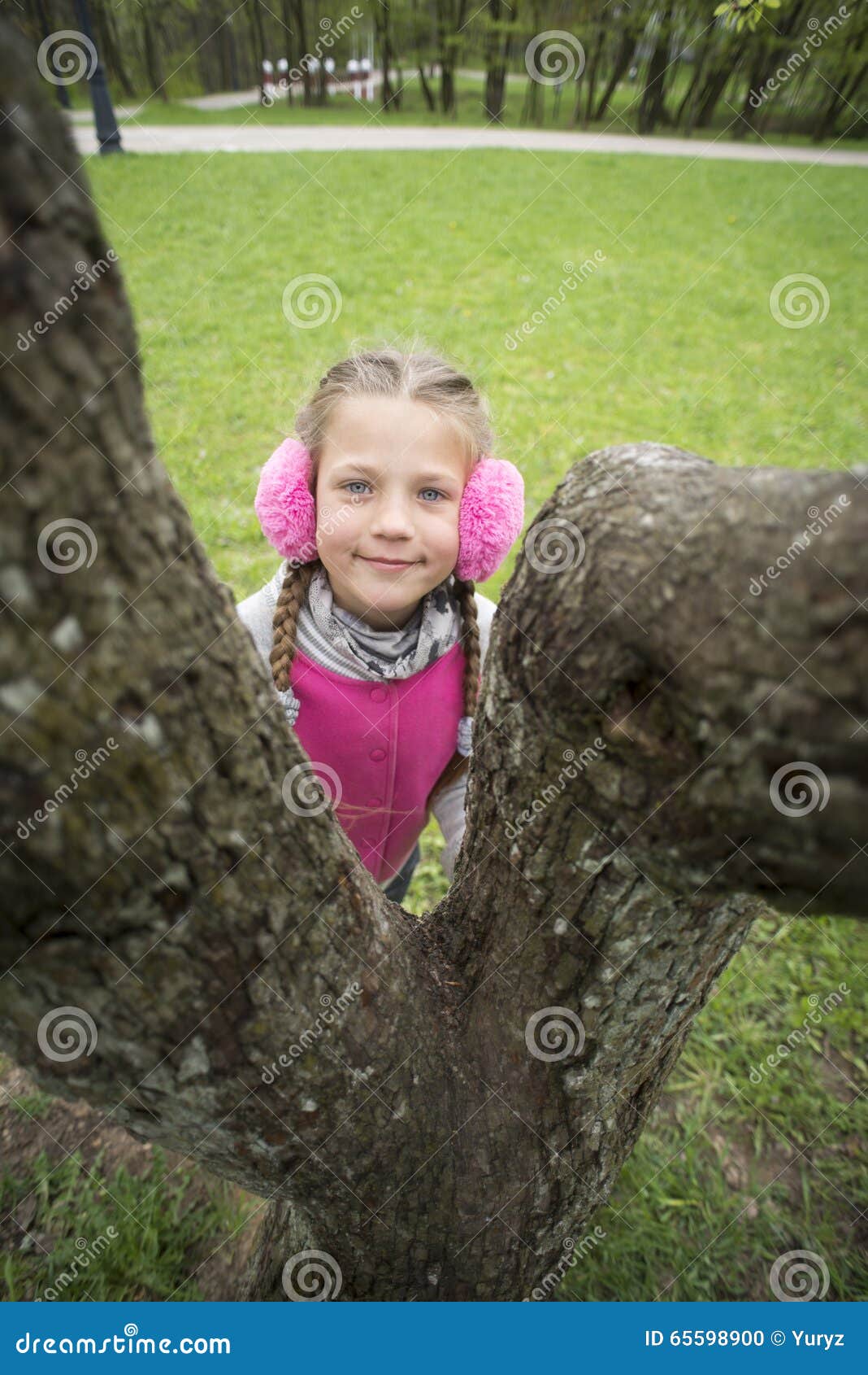 Hidden behind tree stock photo. Image of candid, nature - 65598900