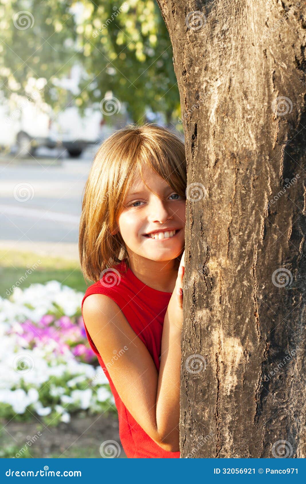 Hidden behind the tree stock image. Image of expression - 32056921