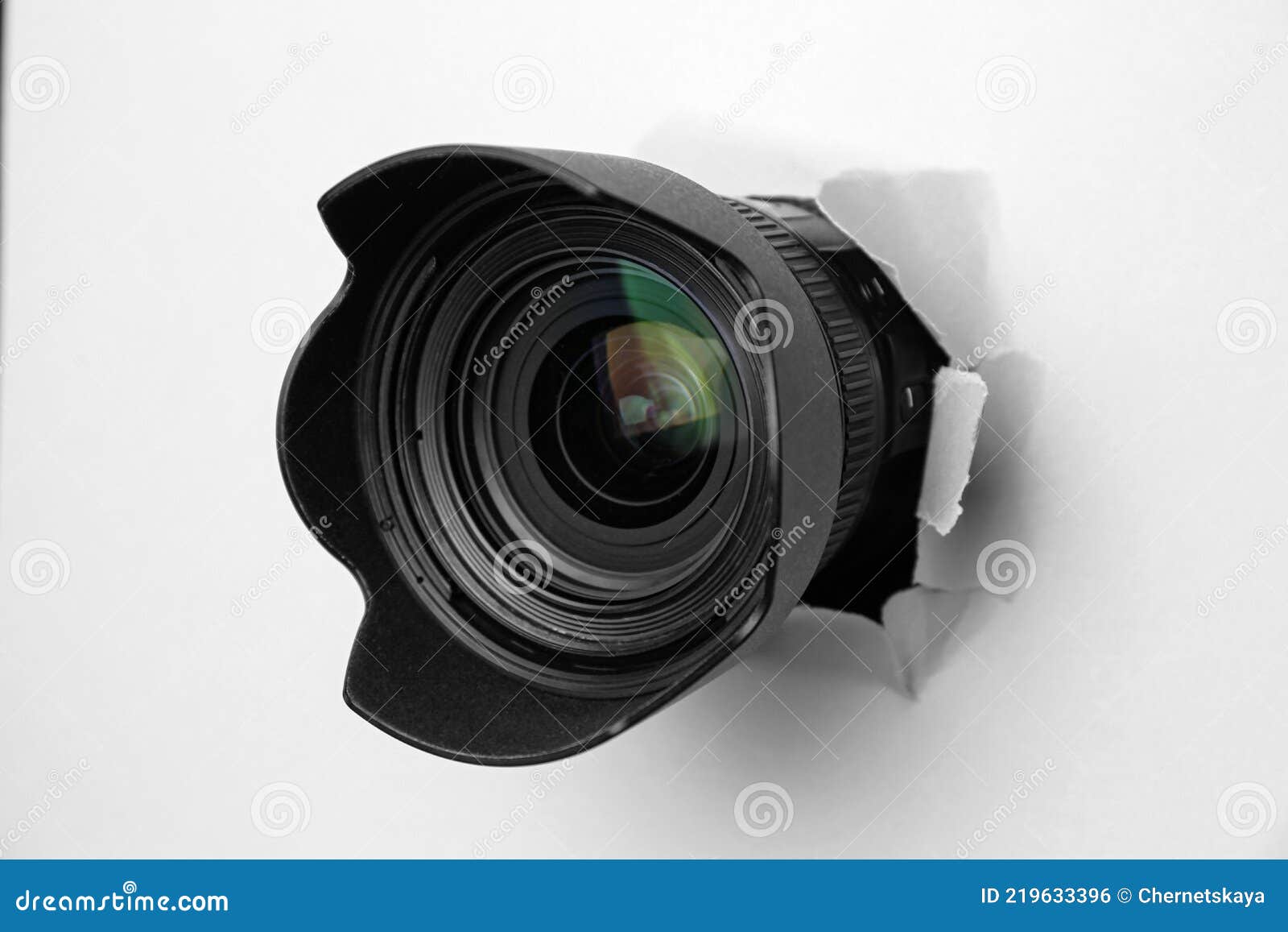 Hidden Camera Lens through Torn Hole in White Paper Stock Photo - Image ...