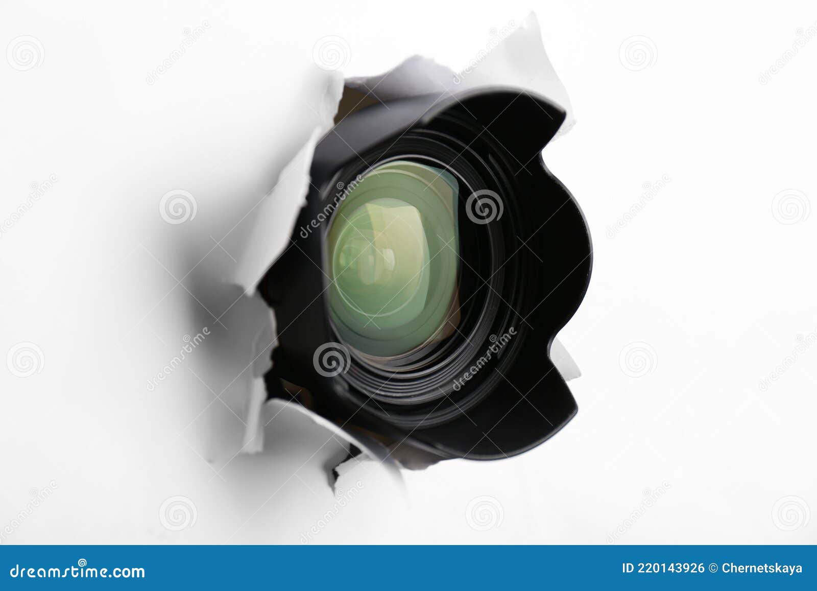 Hidden Camera Lens through Torn Hole in White Paper Stock Photo - Image ...