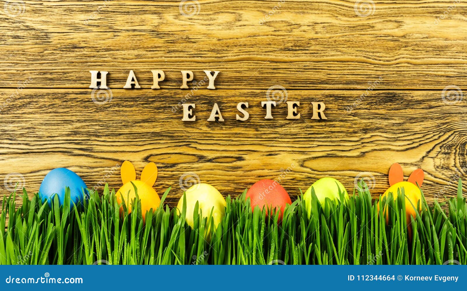 Hidden Easter Bunny in the Grass. Happy Easter Stock Photo - Image of ...