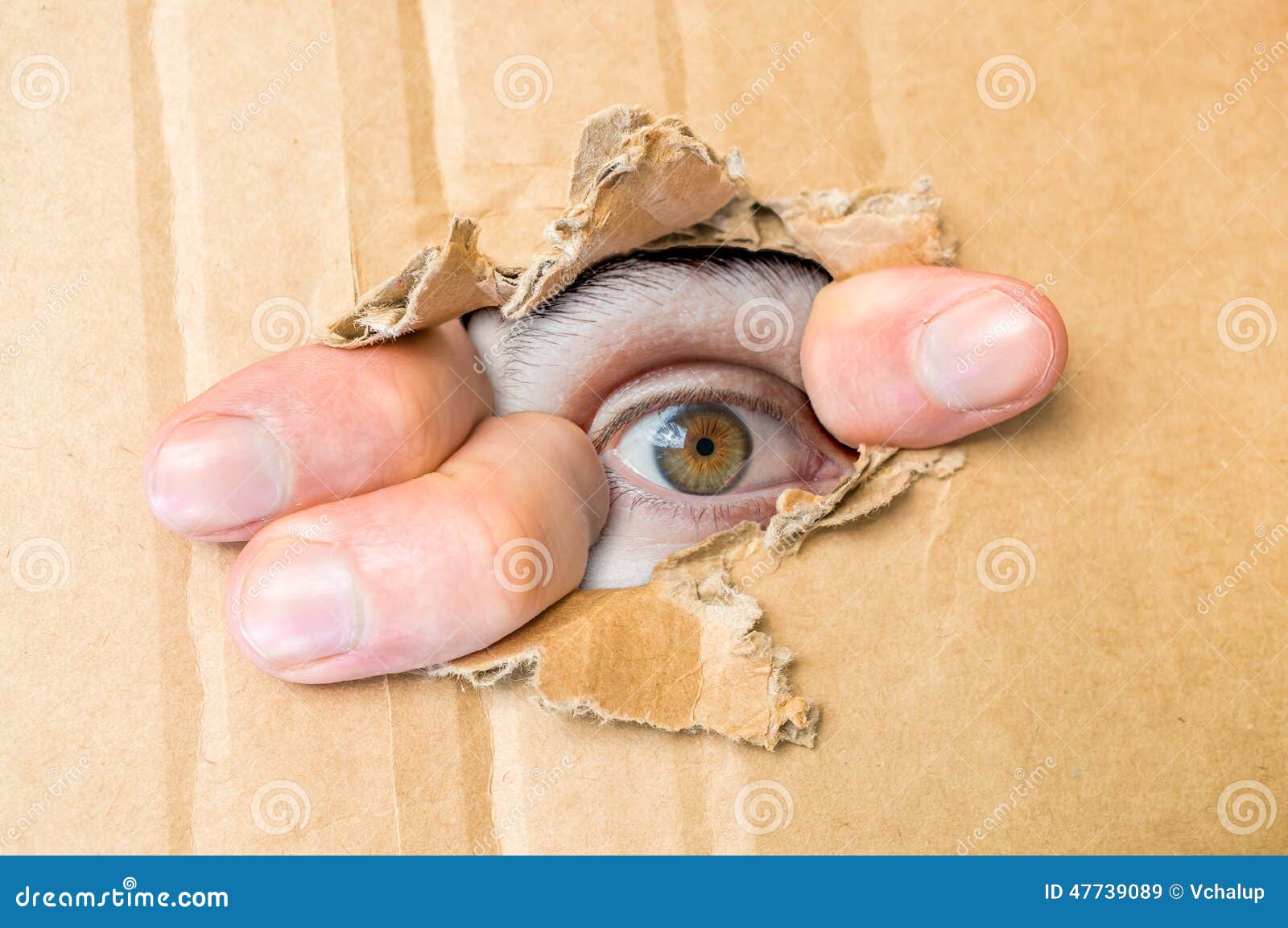 Hidden Eye Watching through Hole in Cardboard Paper Stock Image - Image ...