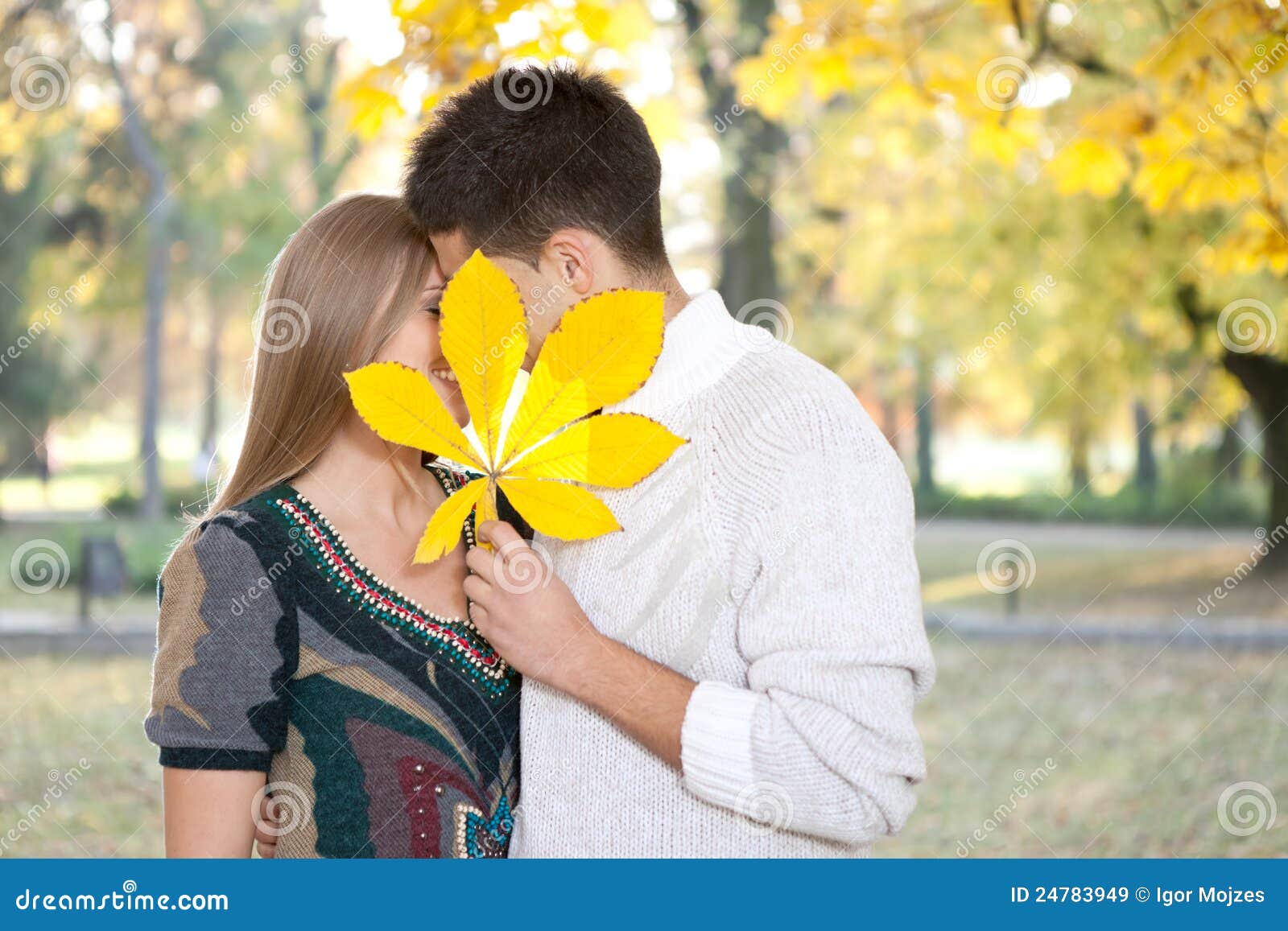 Hidden kiss stock image. Image of lifestyle, autumn, embracing - 24783949
