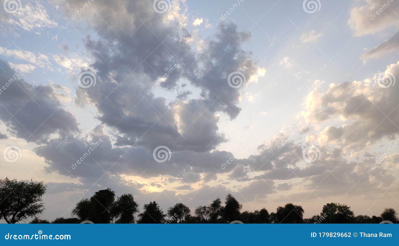 Hidden Sun Behind the Dark Clouds at Evening Time Stock Photo - Image ...