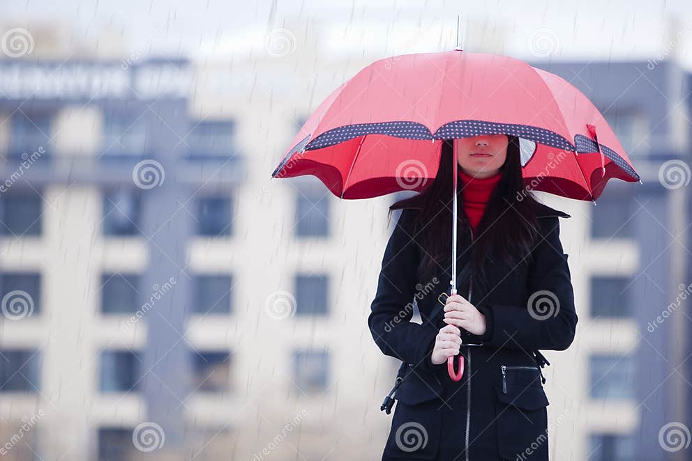 Hidden under umbrella stock photo. Image of boots, hidden - 12878014