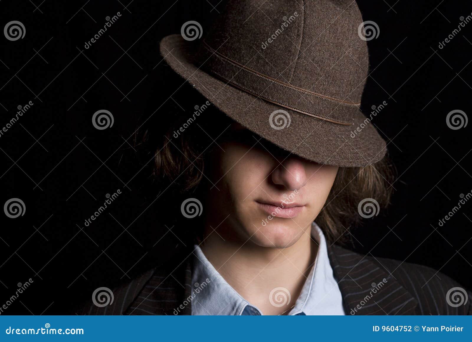 Hidding under a hat stock photo. Image of people, teenager - 9604752