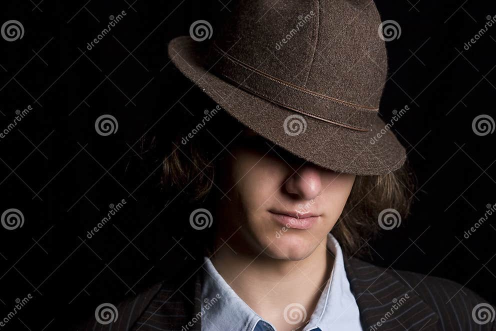 Hidding under a hat stock photo. Image of people, teenager - 9604752