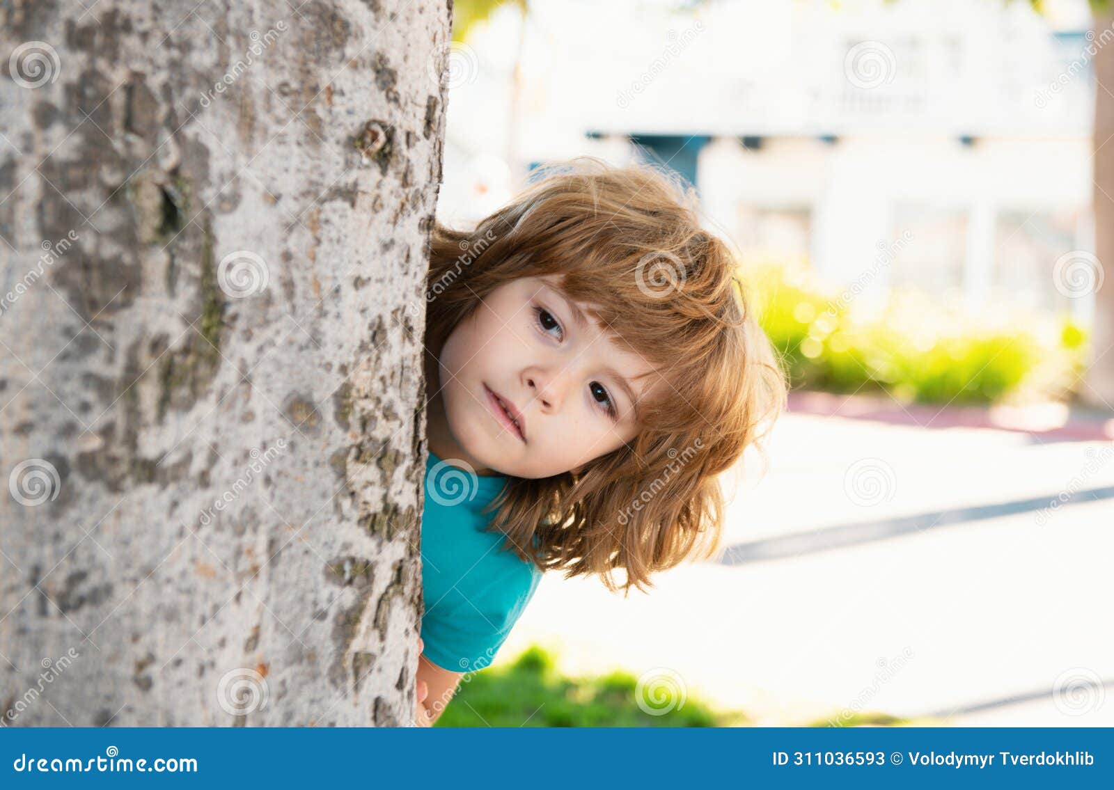 Hide and Seek. Peekaboo. Little Kid Hide by Tree. Kids Vacation. Stock ...