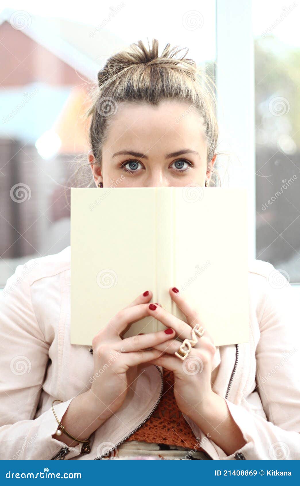 Hiding behind a book stock image. Image of cheerful, healthy - 21408869