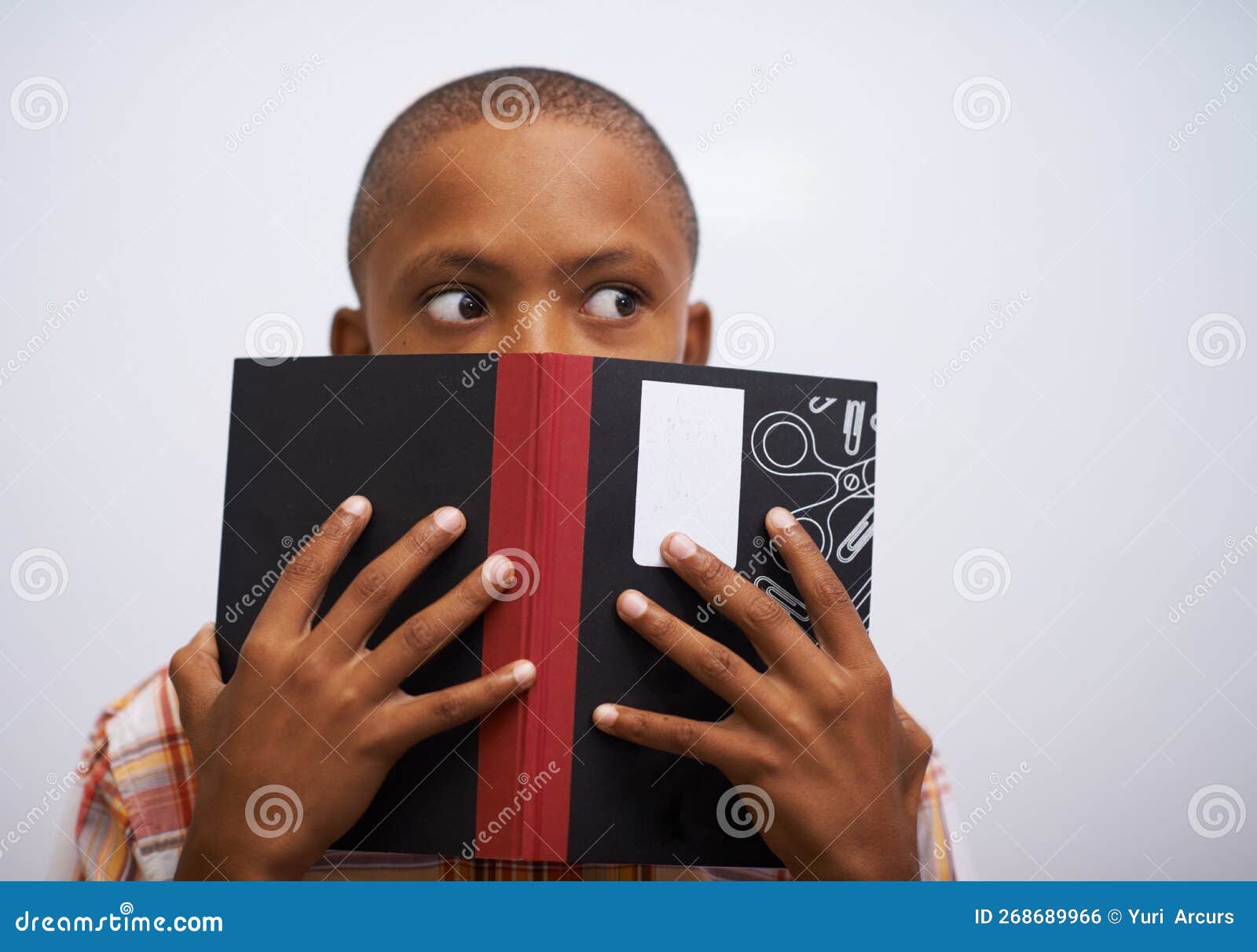 Hiding Behind His Book. a Young Boy Doing Prepared Reading at the Front ...