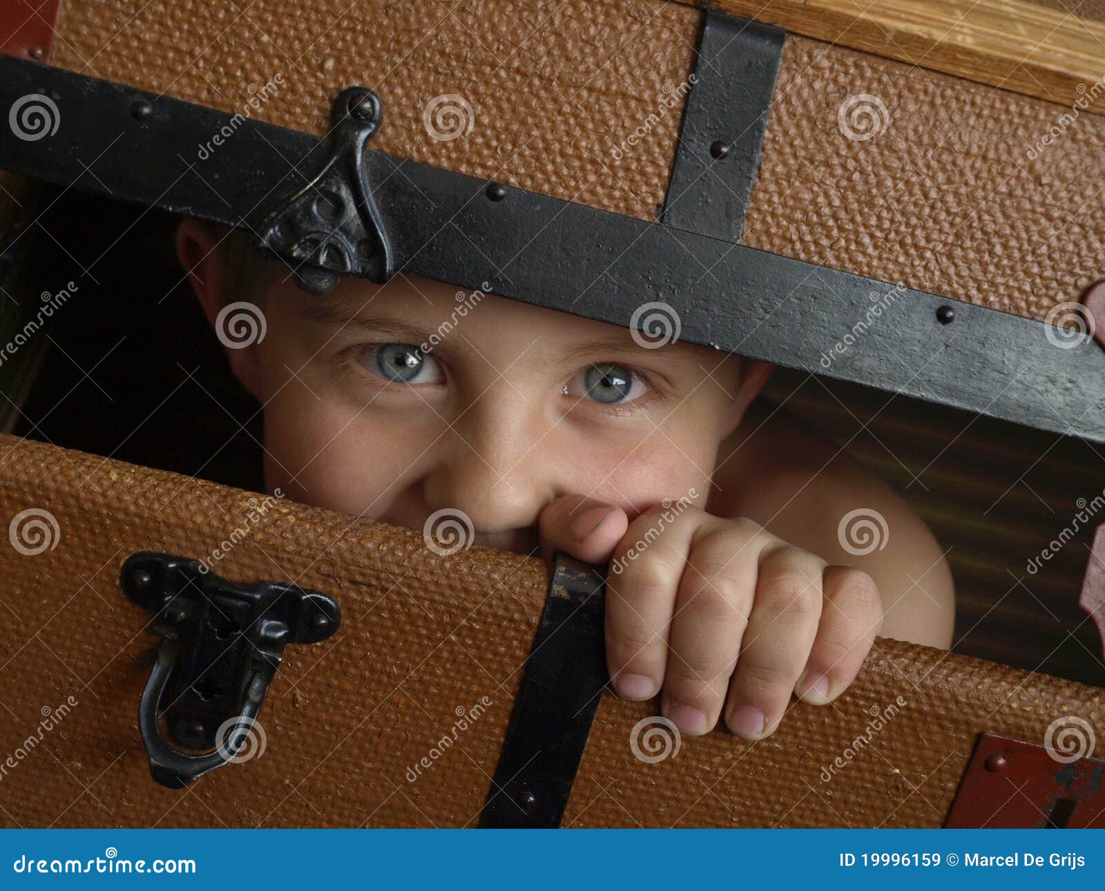 Hiding child stock image. Image of hiding, fingers, blond - 19996159