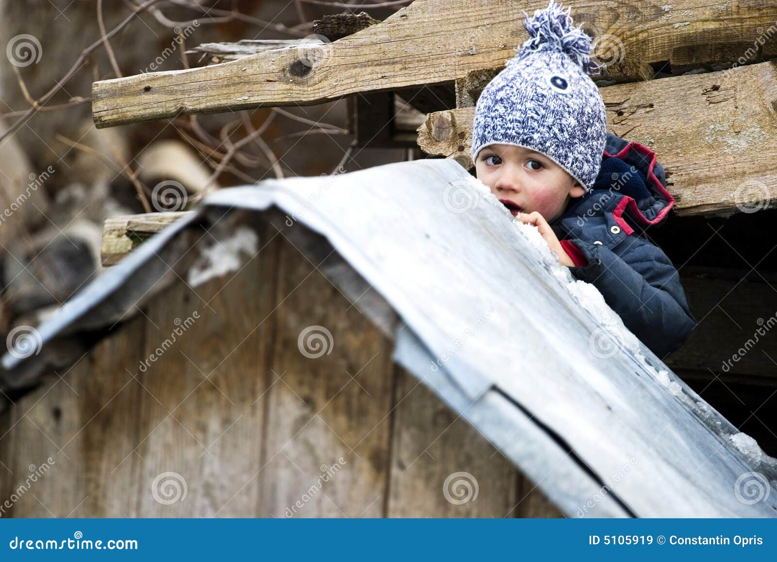 Hiding Child stock image. Image of peeking, fence, playful - 5105919