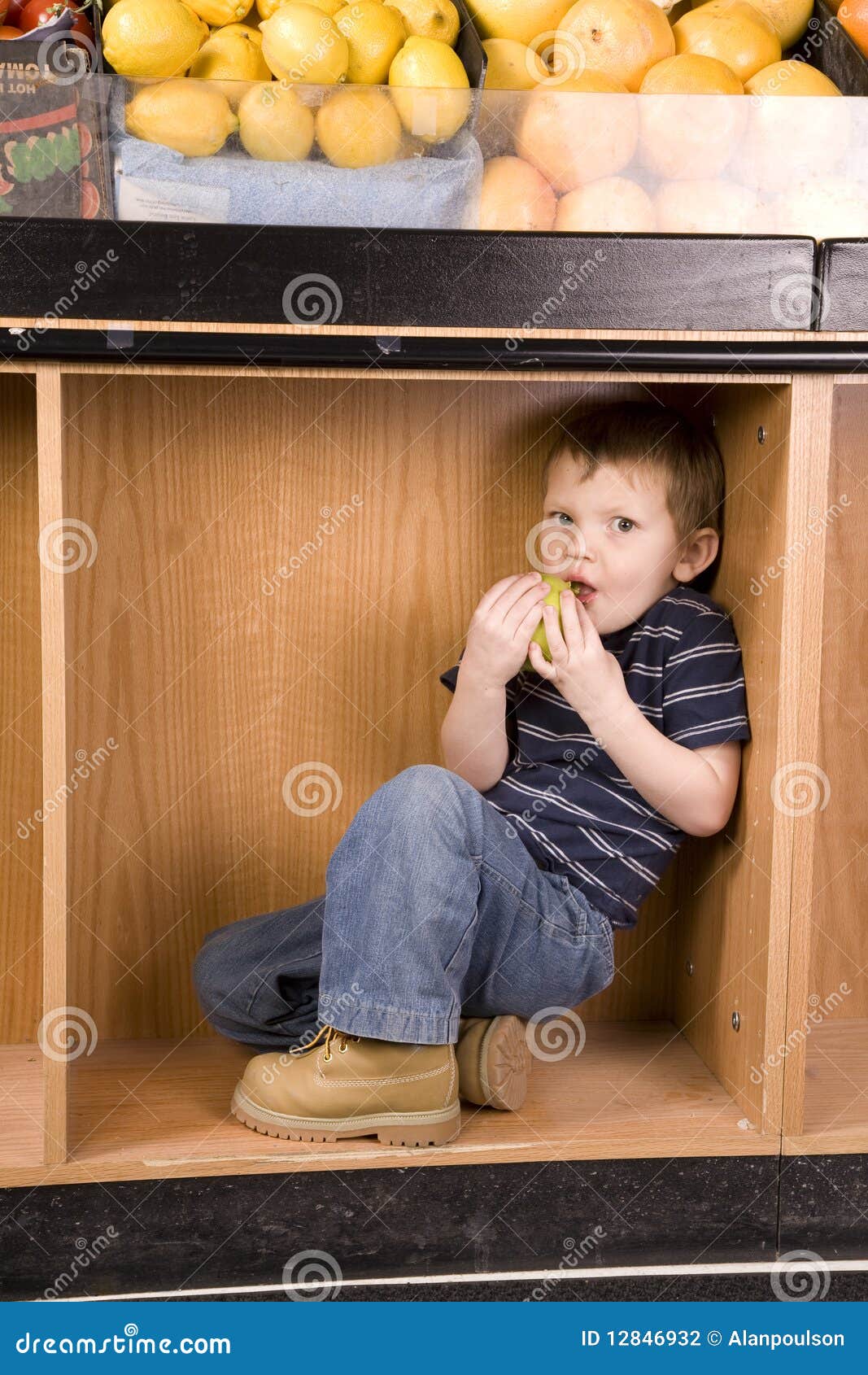 Hiding eating apple stock photo. Image of female, family - 12846932