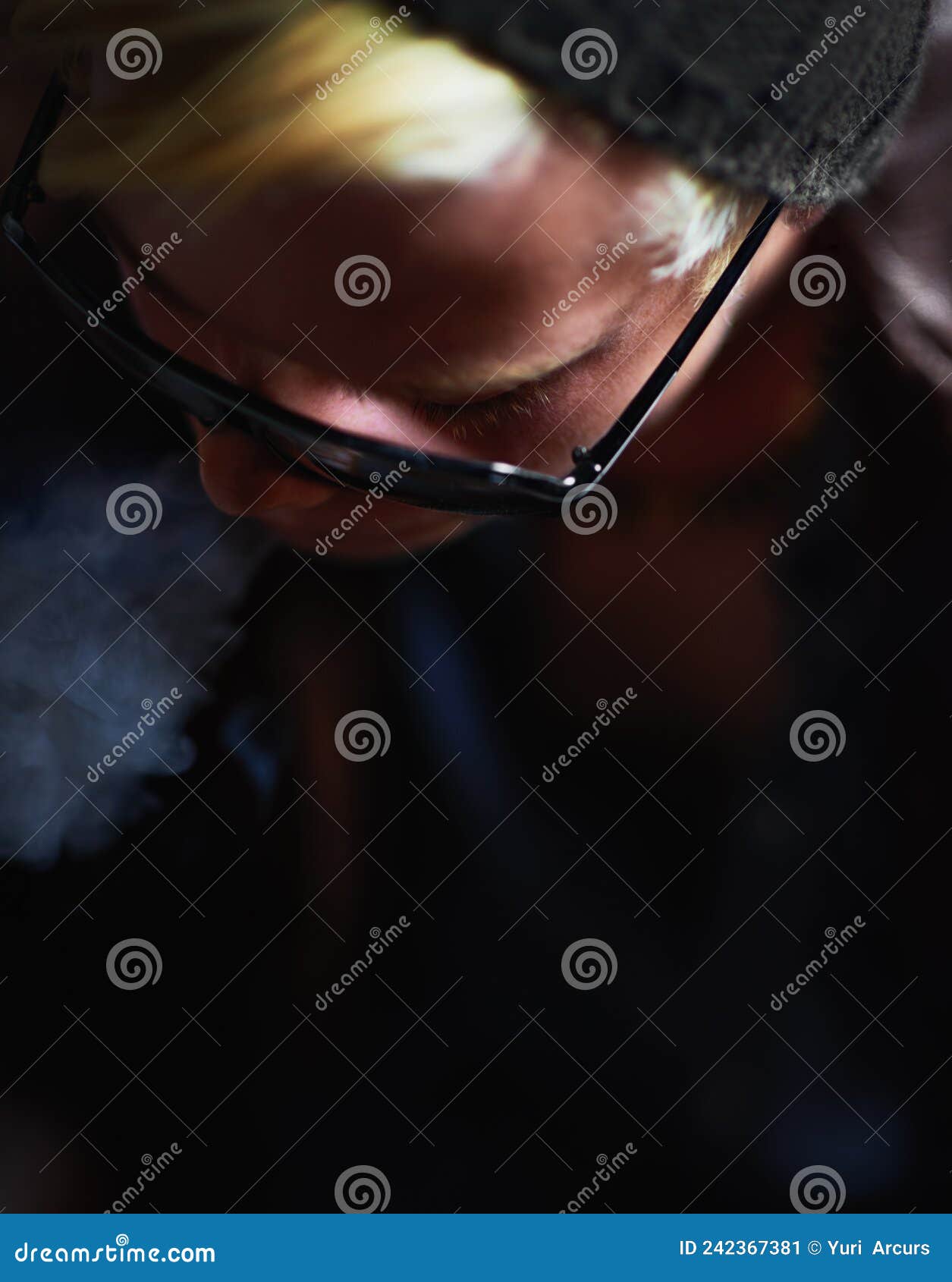 Hiding His Face. High-angle View of a Young Guy in Urban Wear. Stock ...