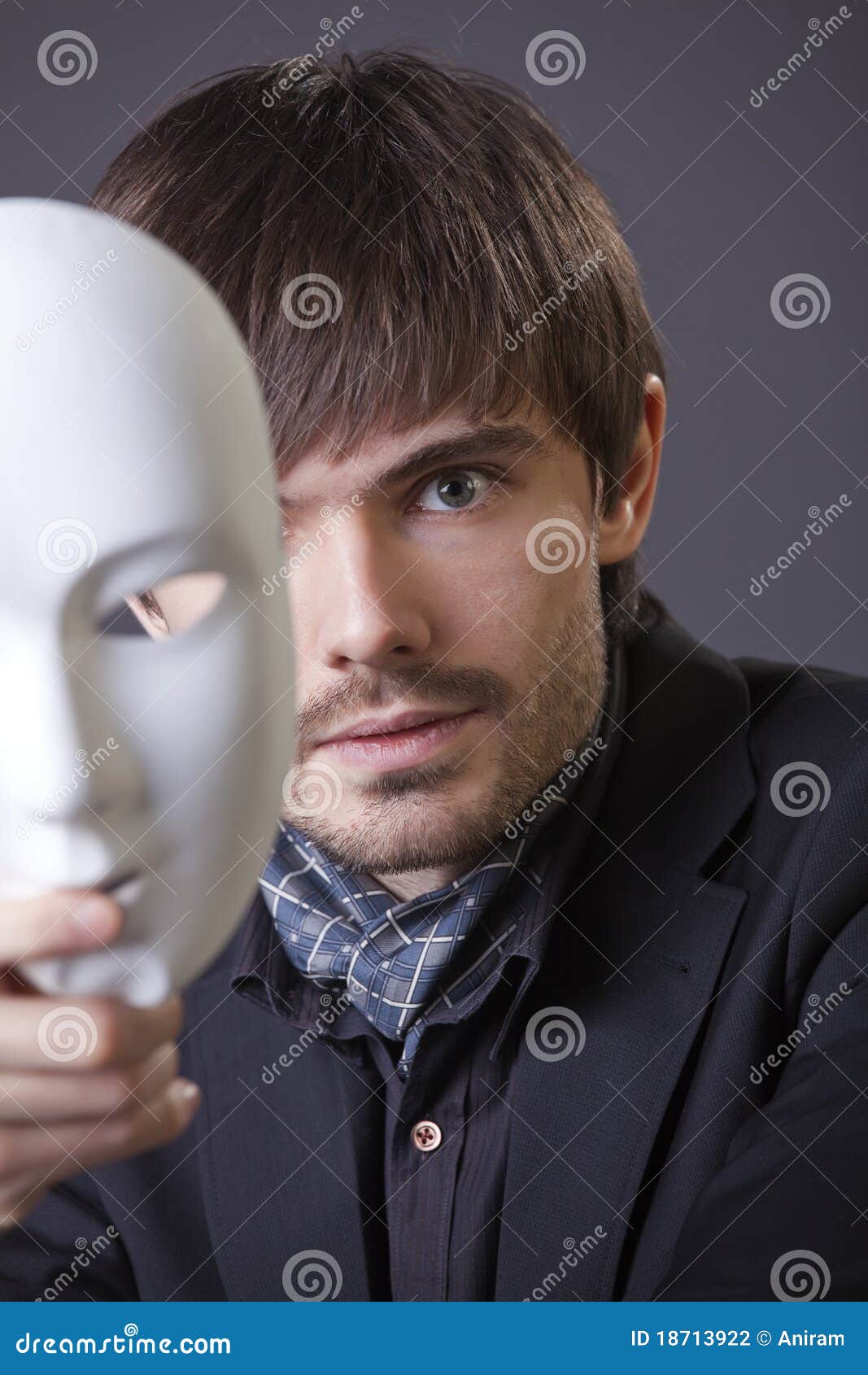 Hiding under mask stock photo. Image of unhappy, mask - 18713922