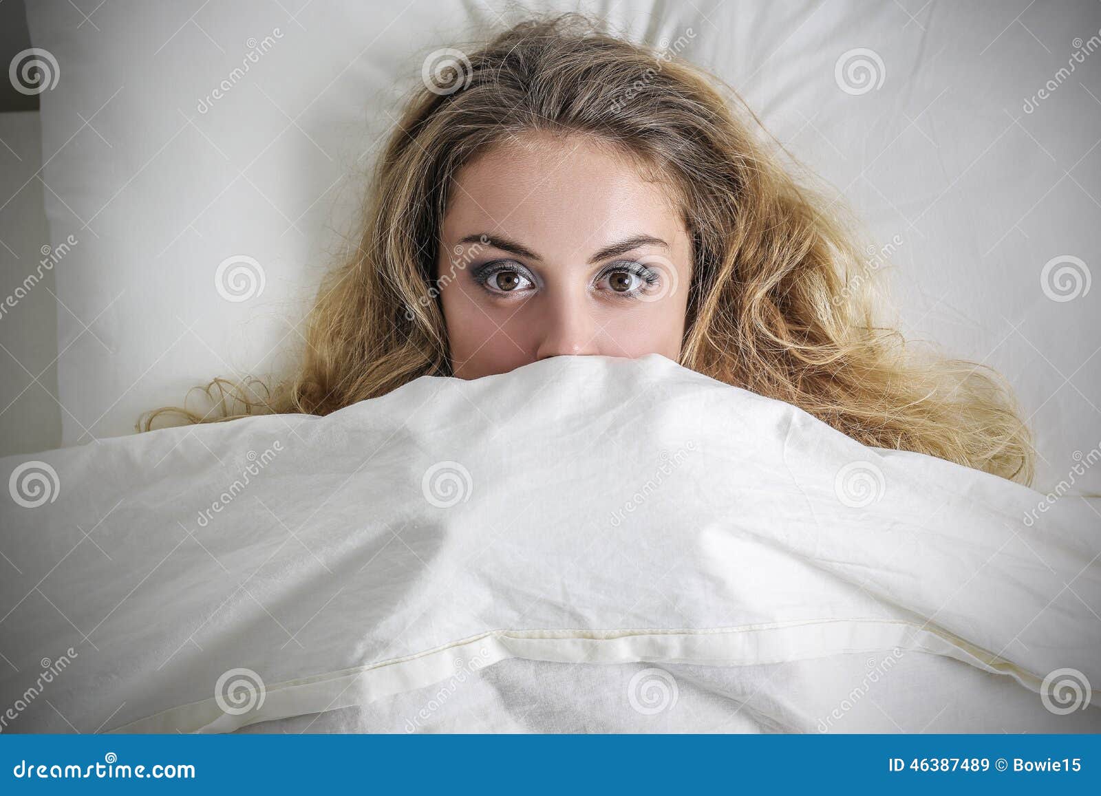 Hiding under the sheets stock image. Image of scared - 46387489