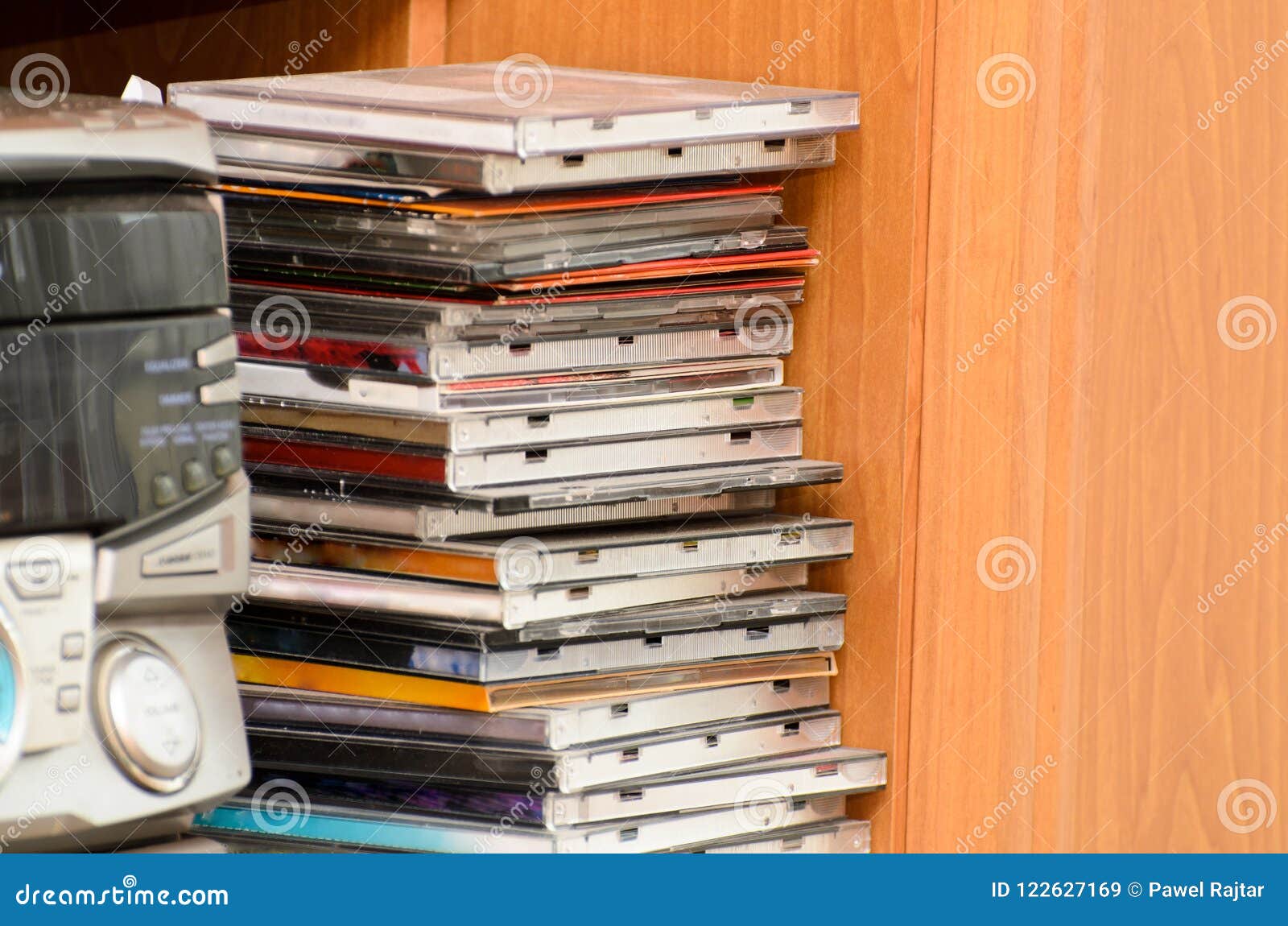 A HiFi Tower with a Collection of Music on CD and DVD. Stock Image ...