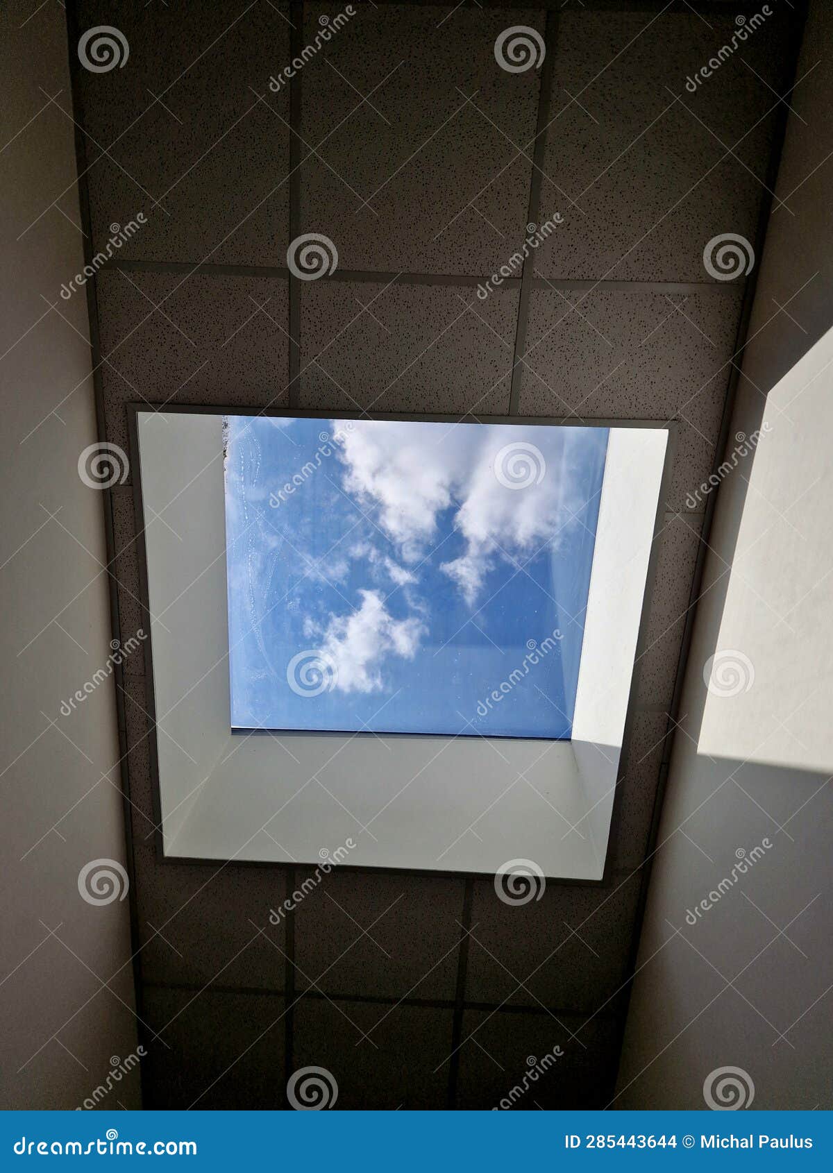 High Above the Head is a Rectangular Window Illuminating the Stock ...