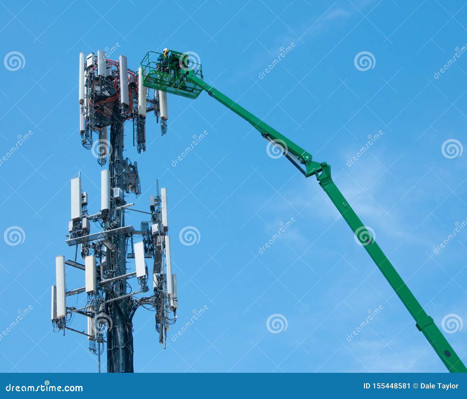 High in the Air, Workmen Maintain a Cell Tower Stock Image - Image of ...