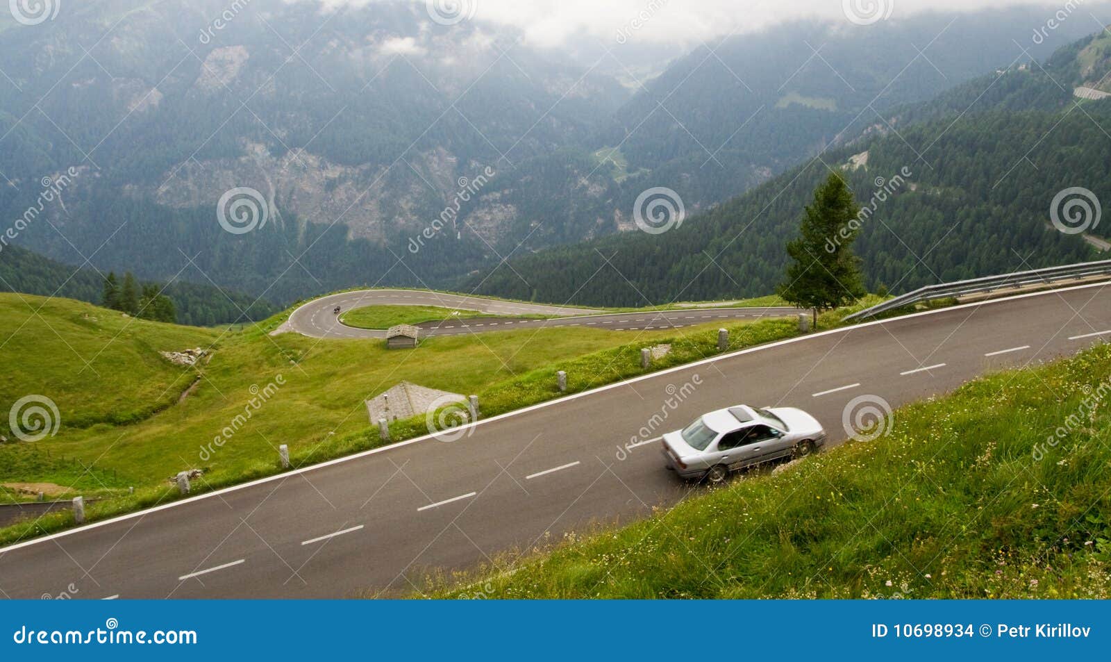 High alpine road with car stock photo. Image of meadows - 10698934