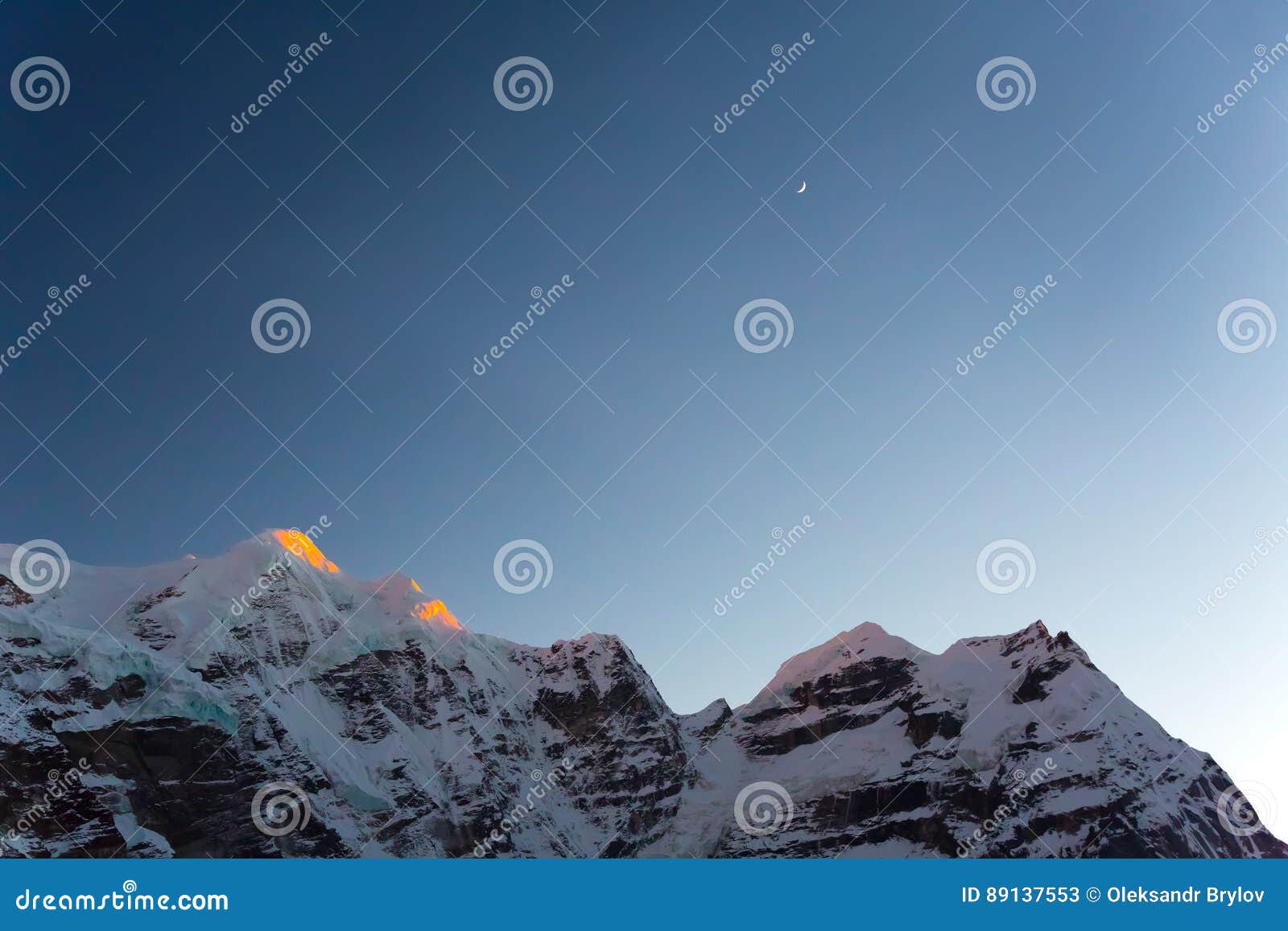 High Altitude Mountain Ridge and Twilight Sky with Young Moon Stock ...