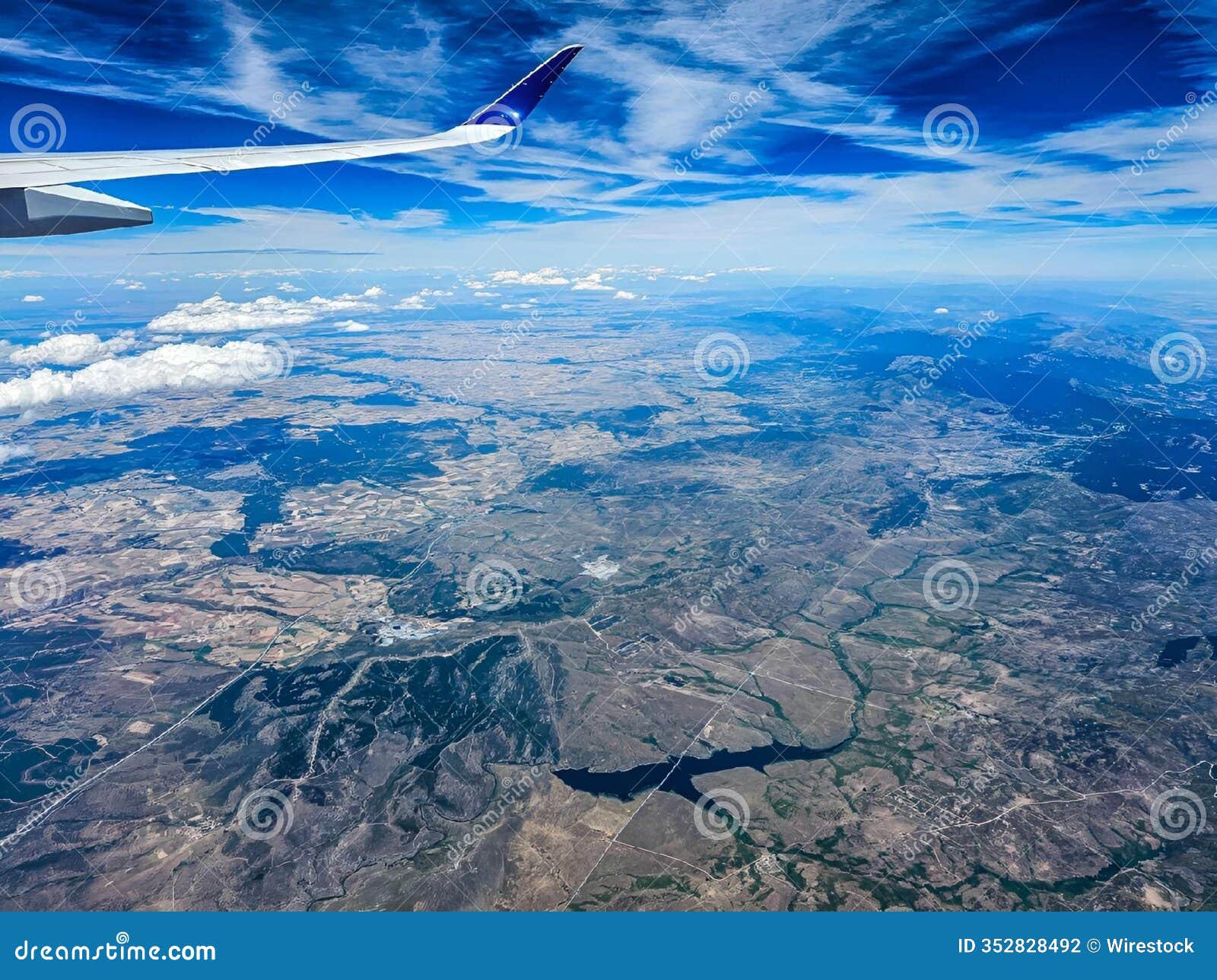 High-altitude View Showcasing a Sprawling Blue Landscape with Rivers ...