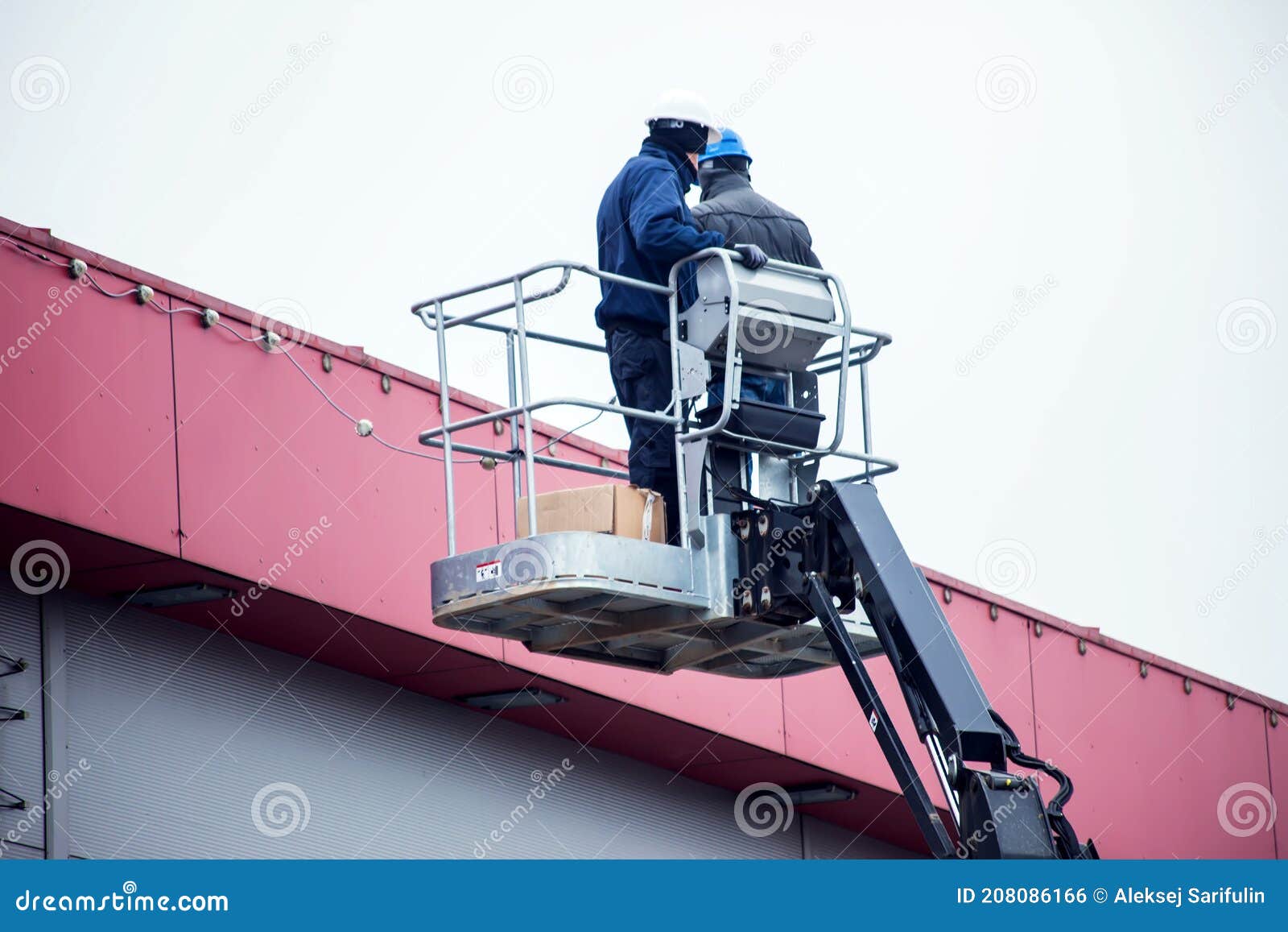 High-altitude Works. Professional Installation Work on a Construction ...