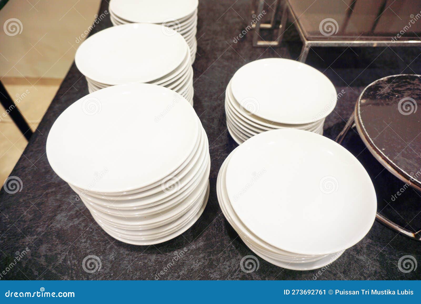 High Angel of Stacks of Many Clean and Shiny Soft White Plates Stock ...