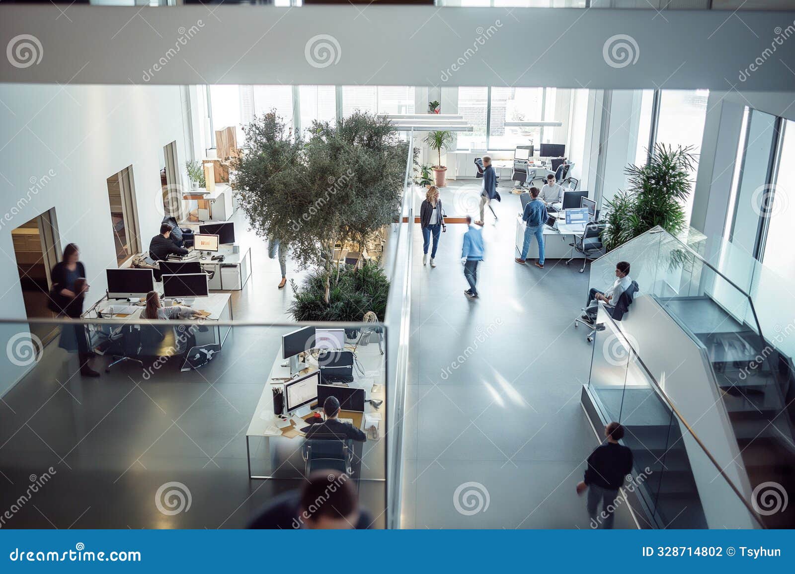 High Angle Blurred Office Workers in Modern Offices Talking and Sitting ...