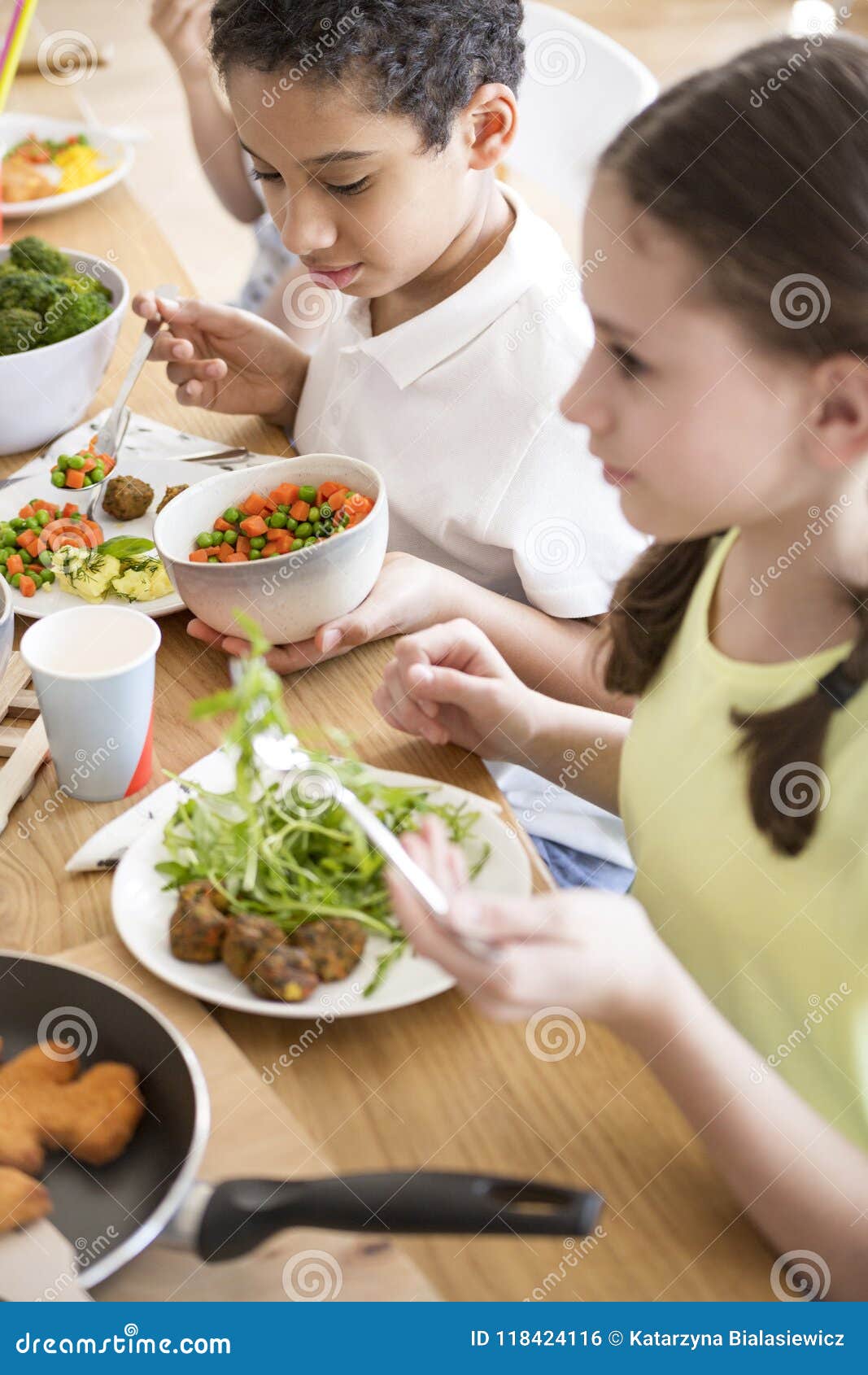 High Angle of Children Eating Vegetables at School Stock Photo - Image ...