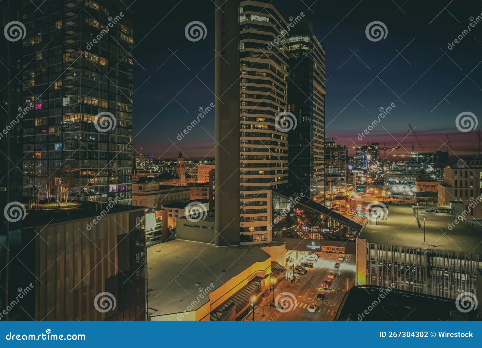 High Angle of a Cityscape Illuminated by Lights in the Evening ...