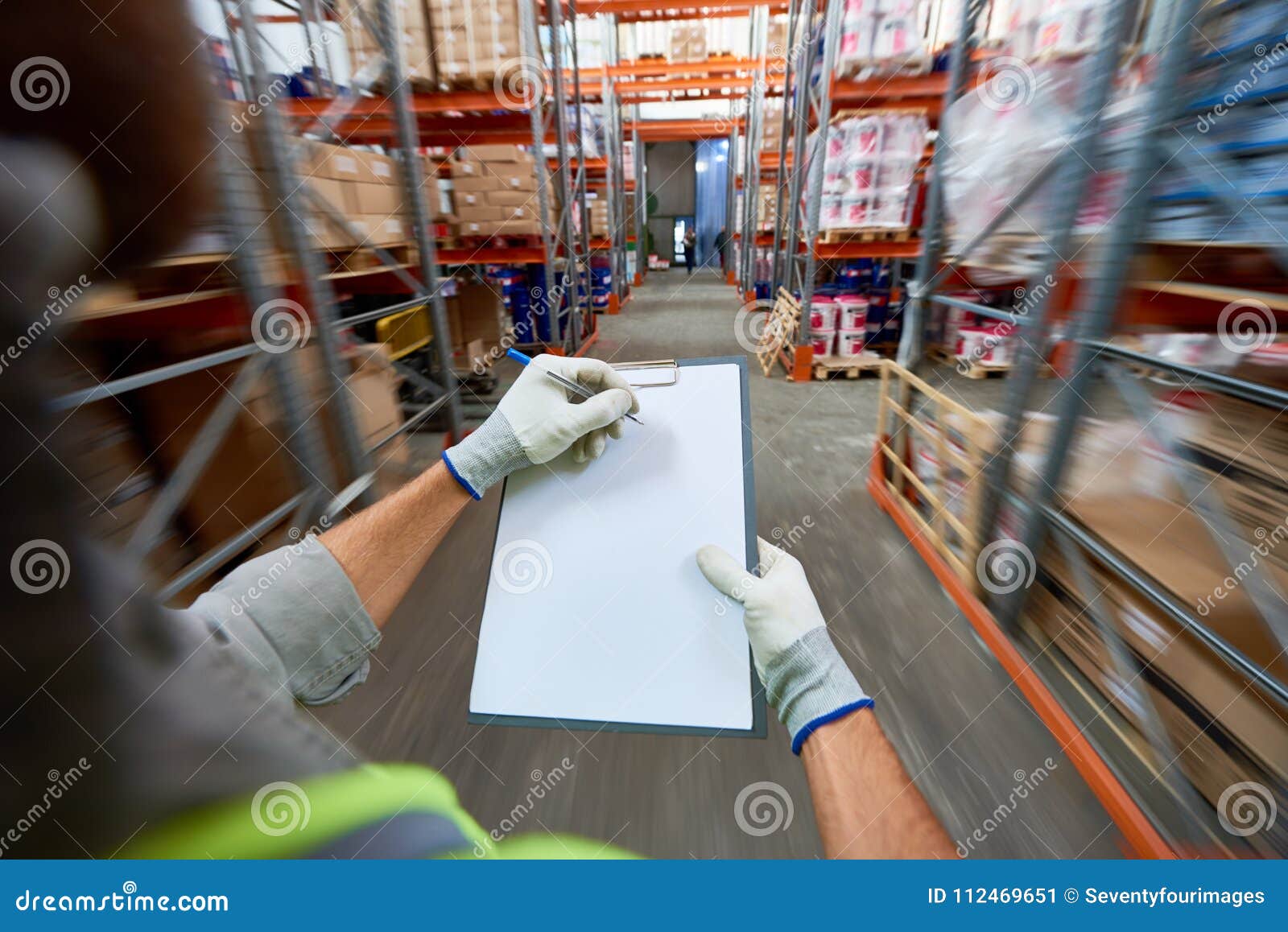 Worker Filling Documents in Warehouse Stock Image - Image of motion ...