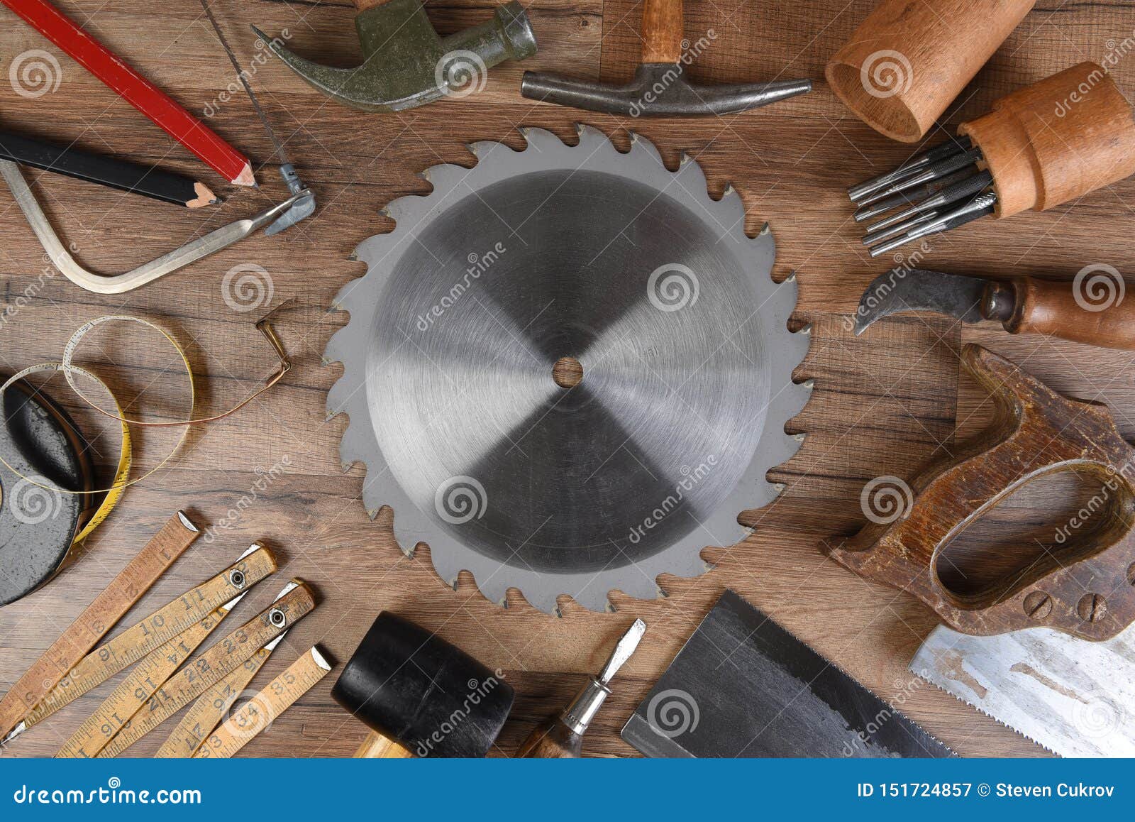 High Angle Closeup of a Large Group of Tools Arranged Around a Round ...