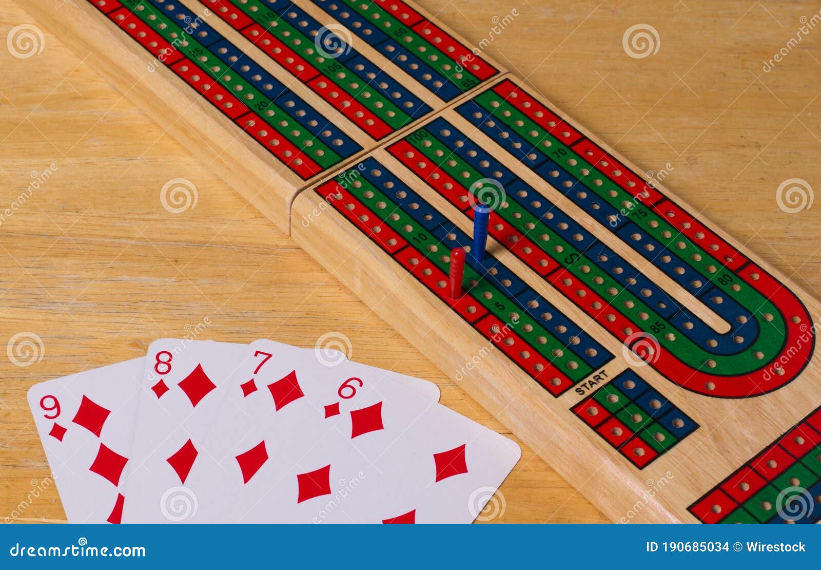 High Angle Closeup Shot of Playing Cards and the Board Game Cribbage ...