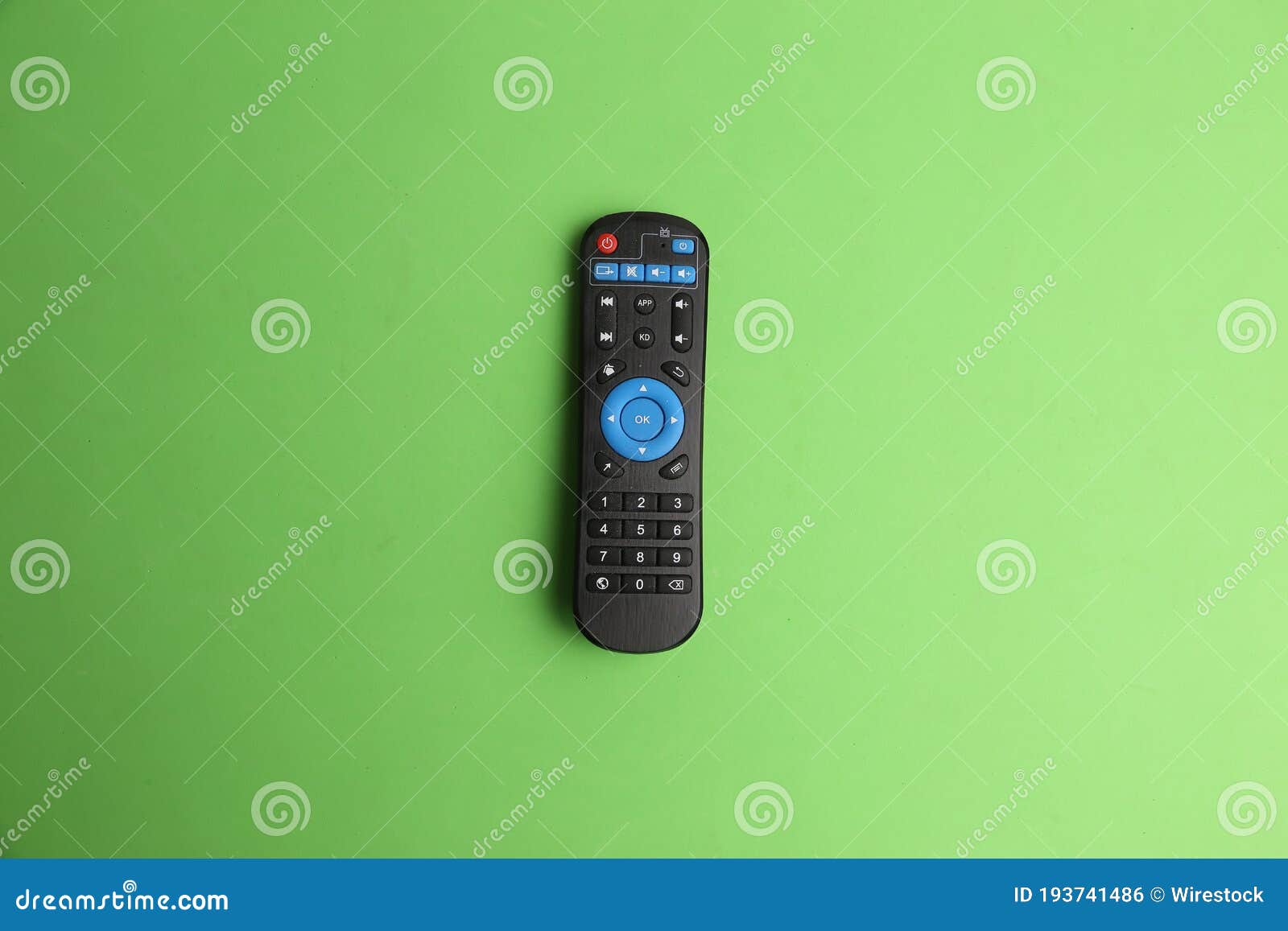 High Angle Closeup Shot of a Remote Controller Isolated on a Green ...
