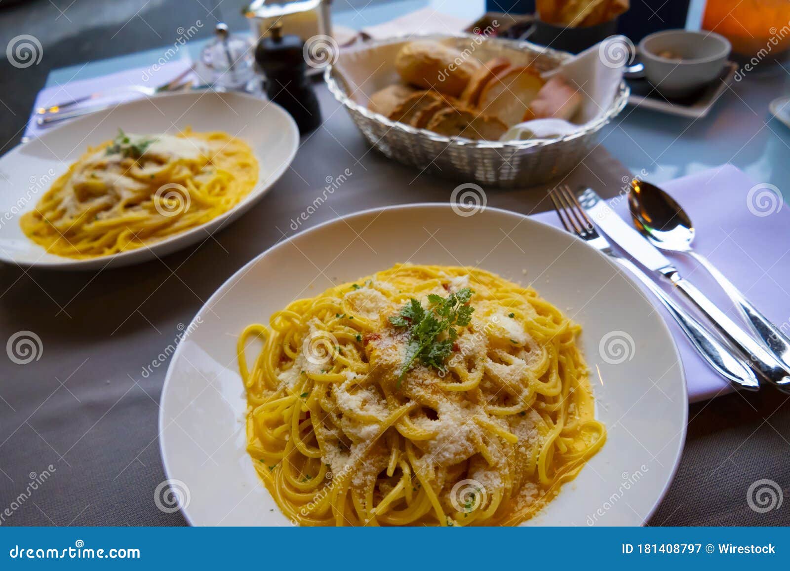 High Angle Closeup Shot of Two Plates with Carbonara Spaghetti on a ...