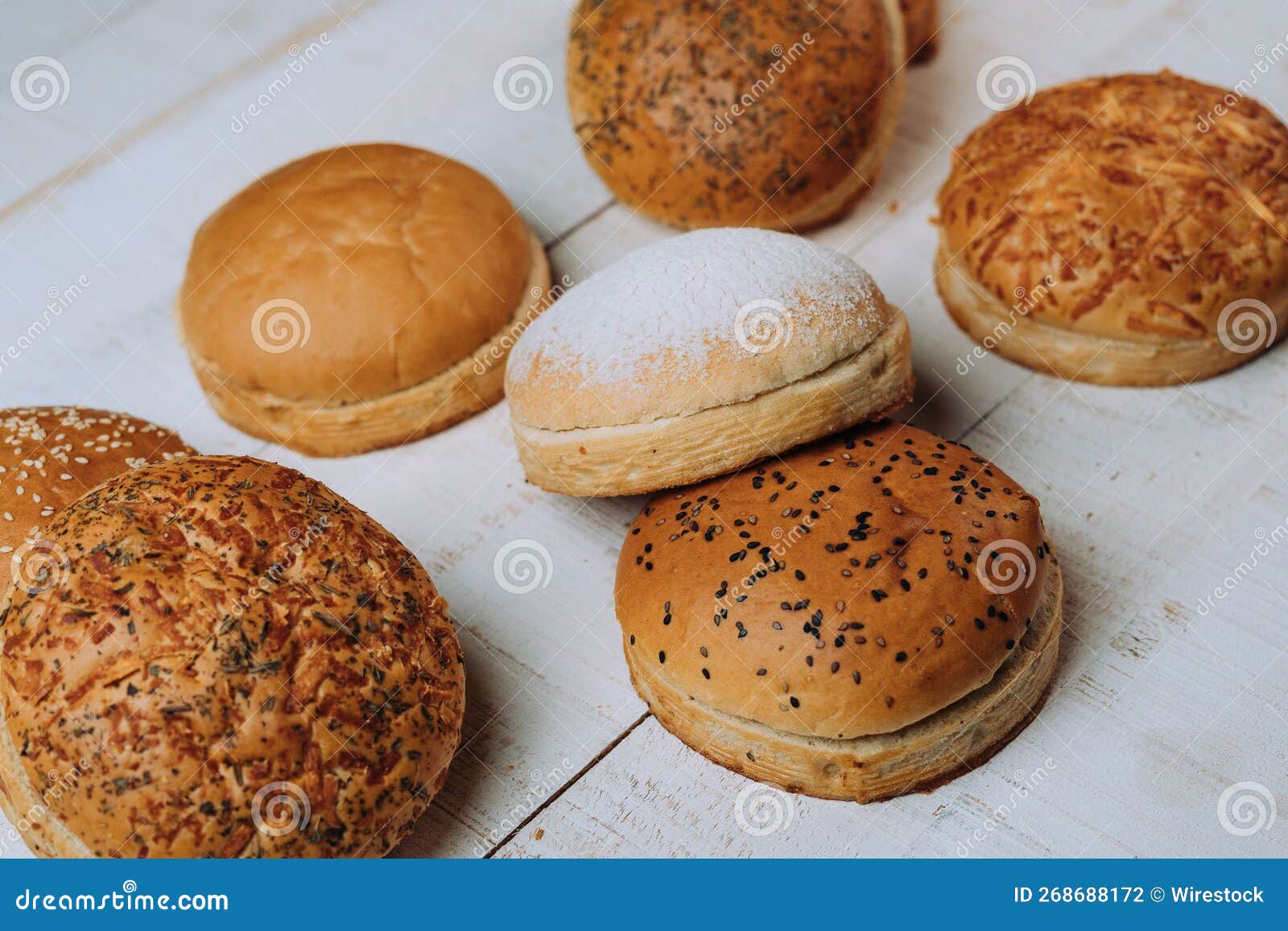 High Angle of the Freshly Baked Bun Breads Put on the White Table ...
