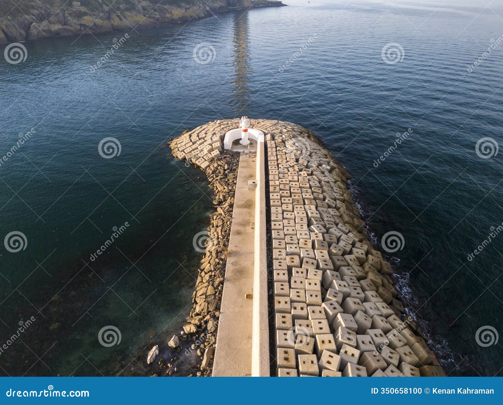 Aerial View of a Coastal Breakwater with Lighthouse. Stock Photo ...